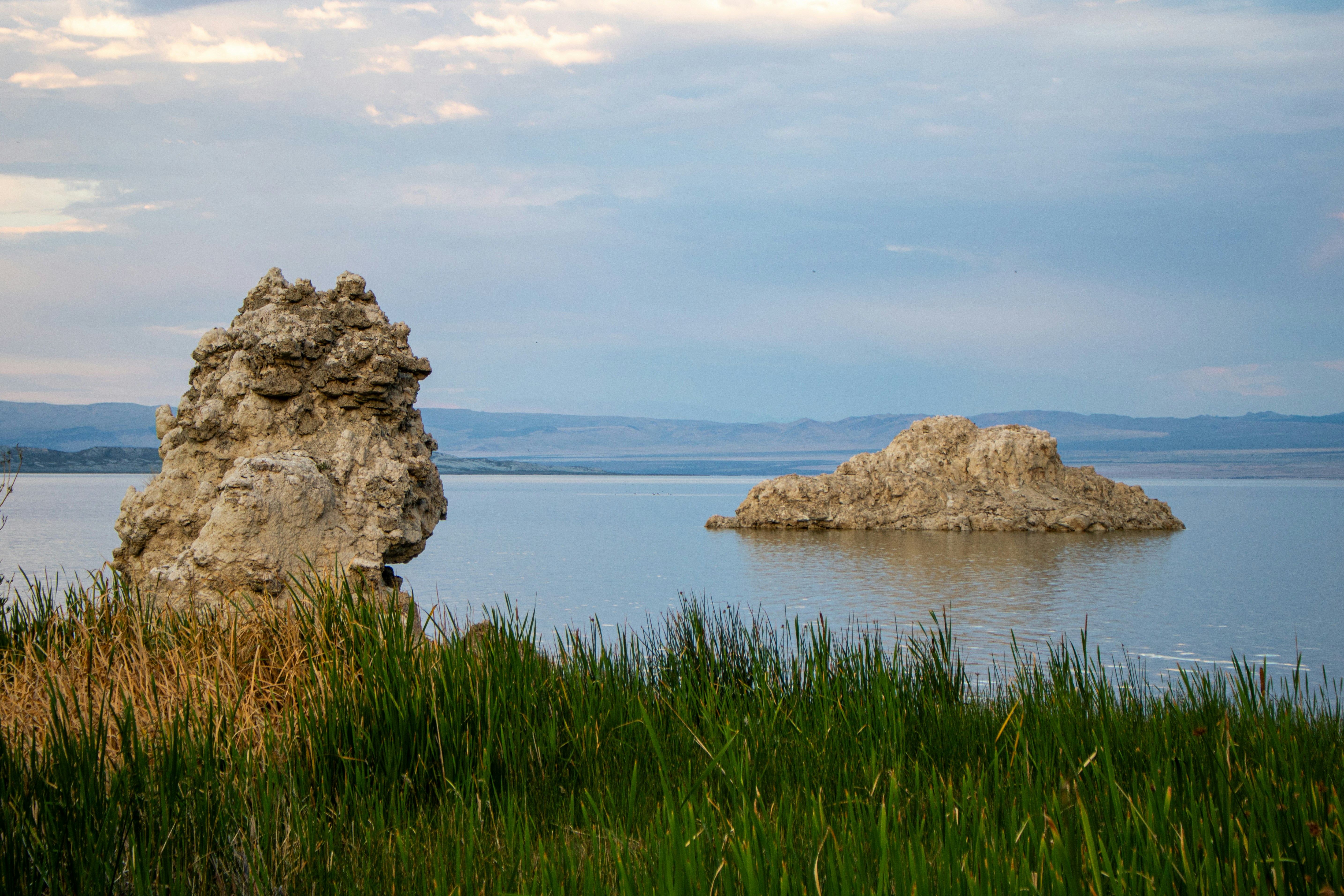 Stone Sentinels Guard a Glassy Lake
