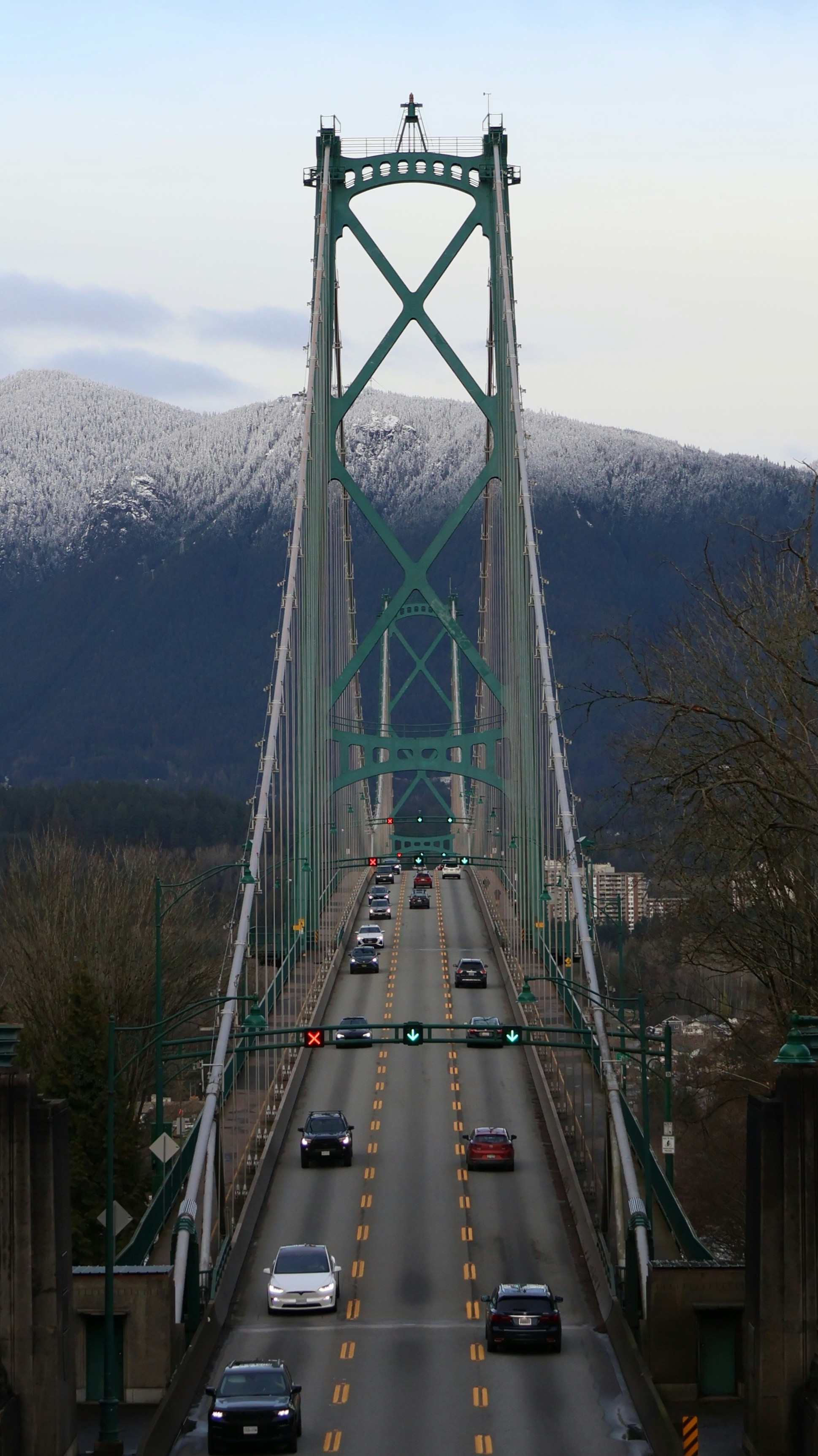 A view of a bridge with cars going over it photo – Free Lions gate ...