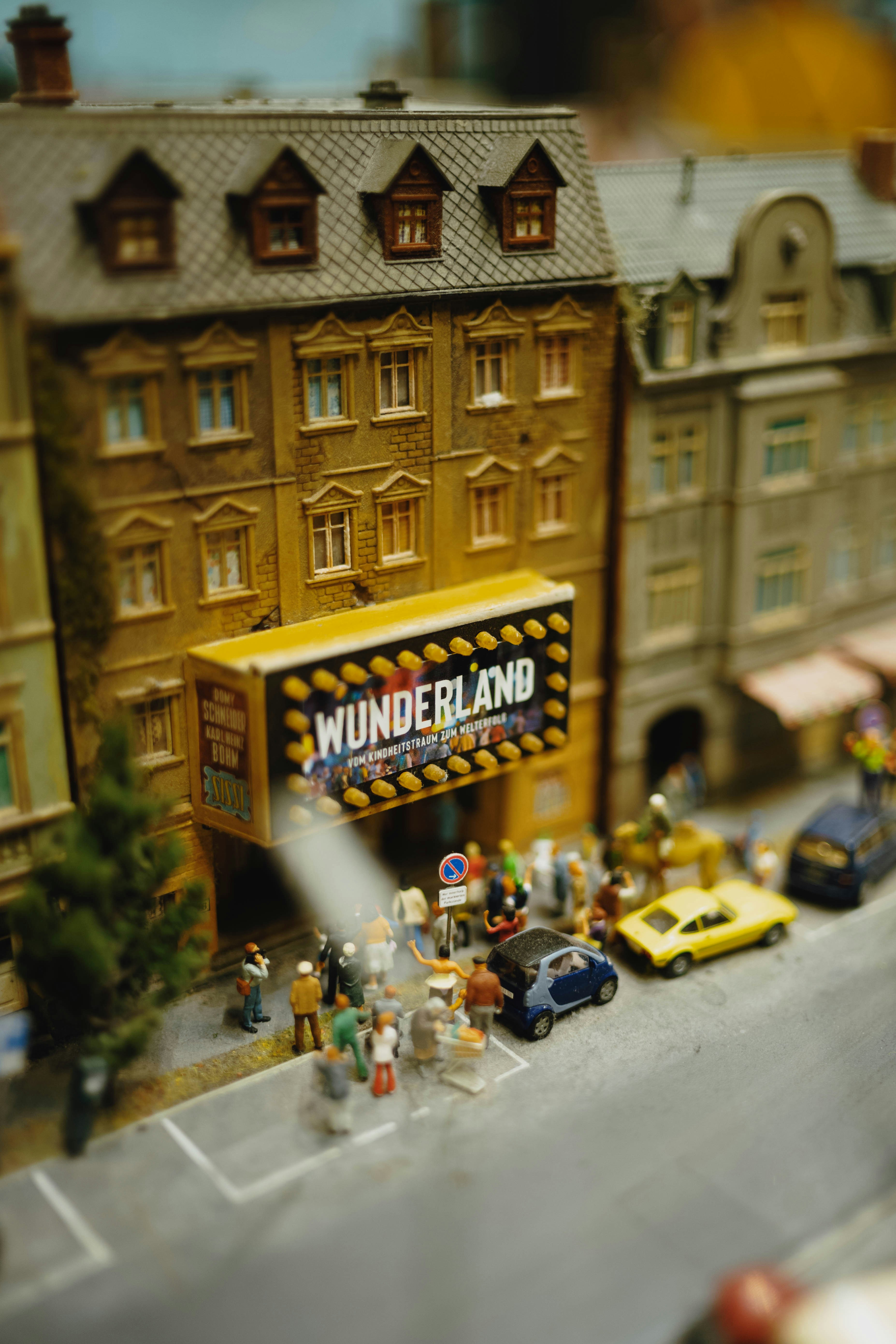 Miniature Street Scene: Wunderland’s Neon Sign & Crowd