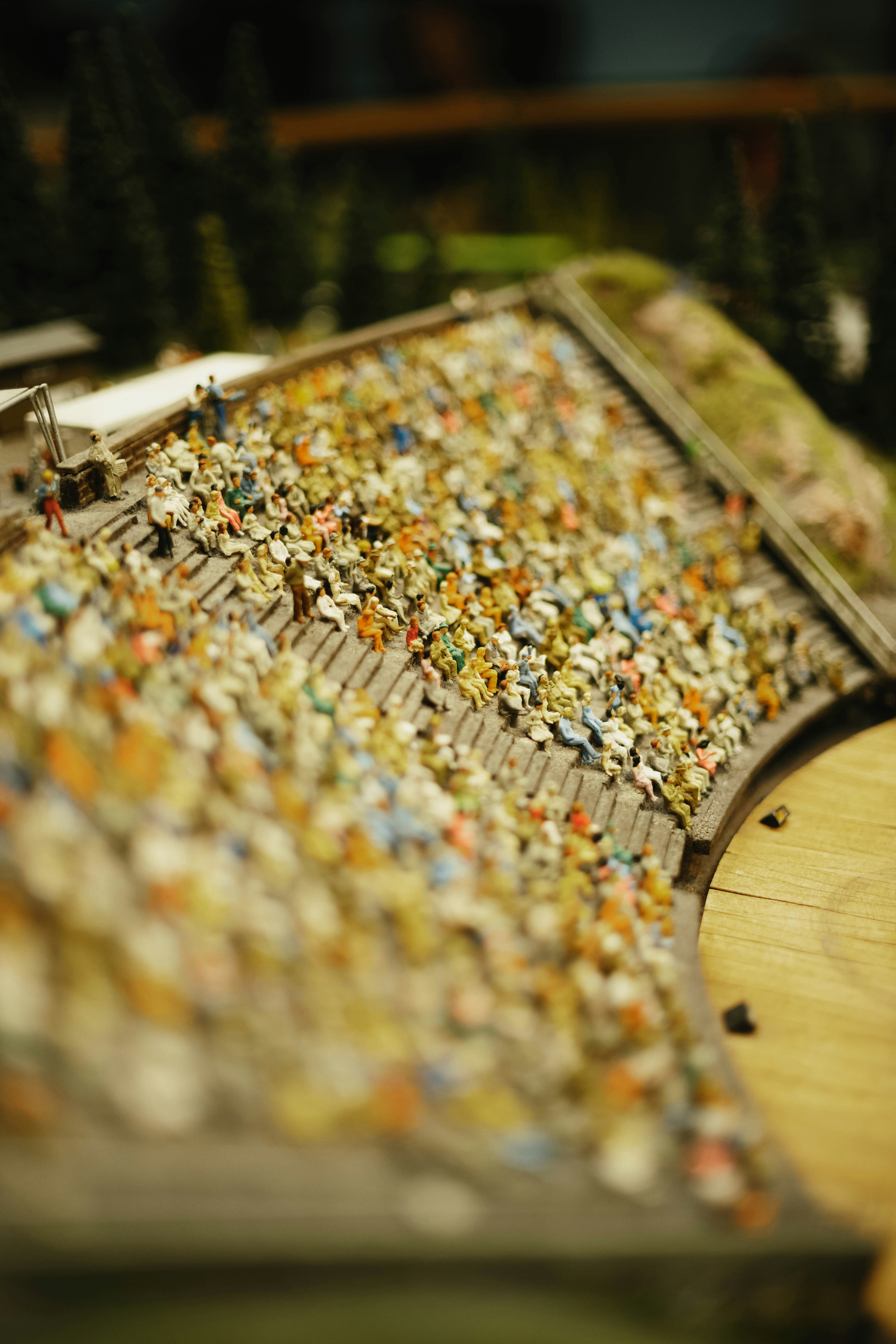 A wooden table topped with lots of small toys