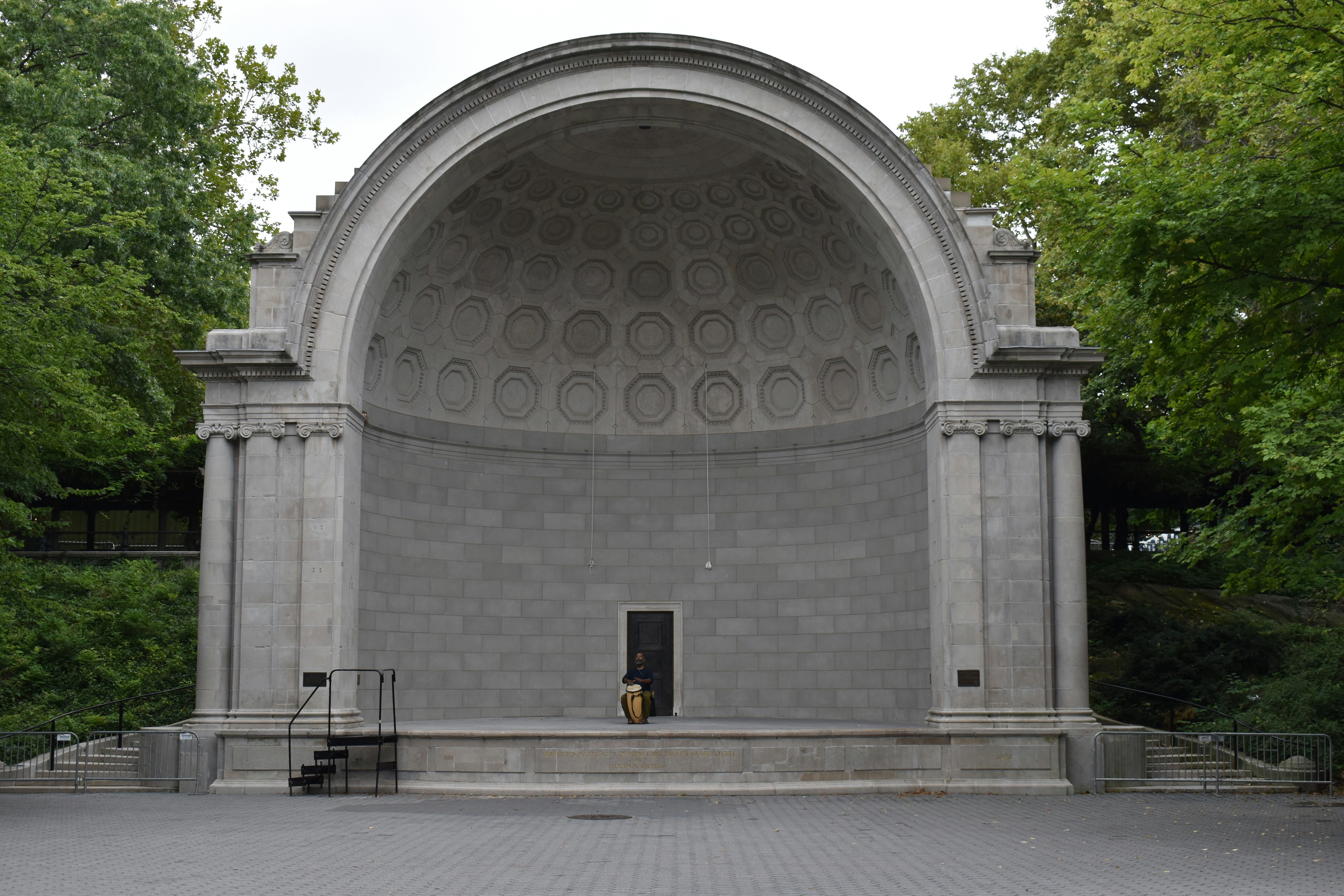 Solitary Figure Beneath the Semicircular Arch: Stone Geometry in Quiet
