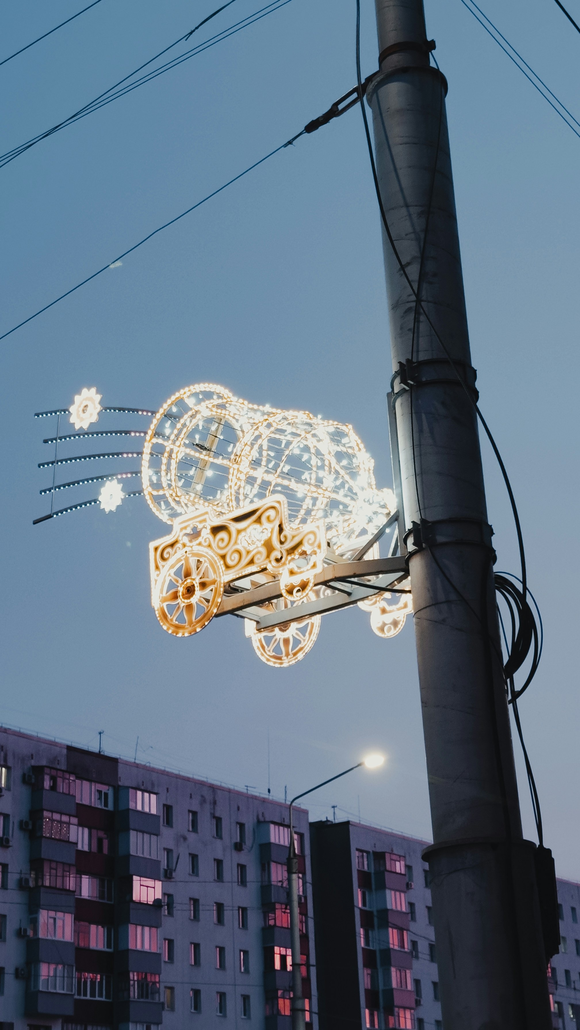Night-Glow Carriage: Neon Sculpture Drifting Over a Quiet City