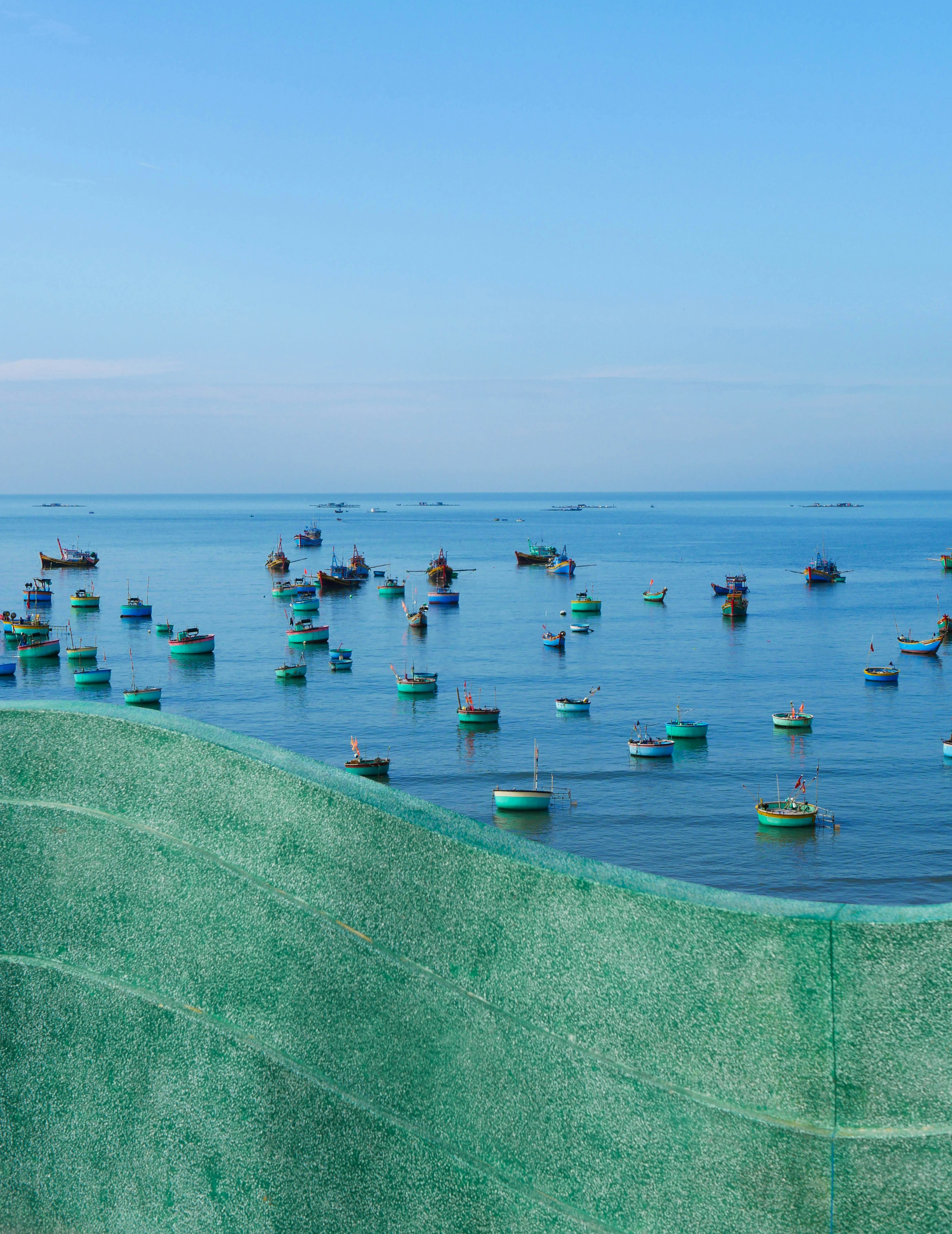 Harbor Harmony: A Dance of Fishing BoatsLisa van Vliet