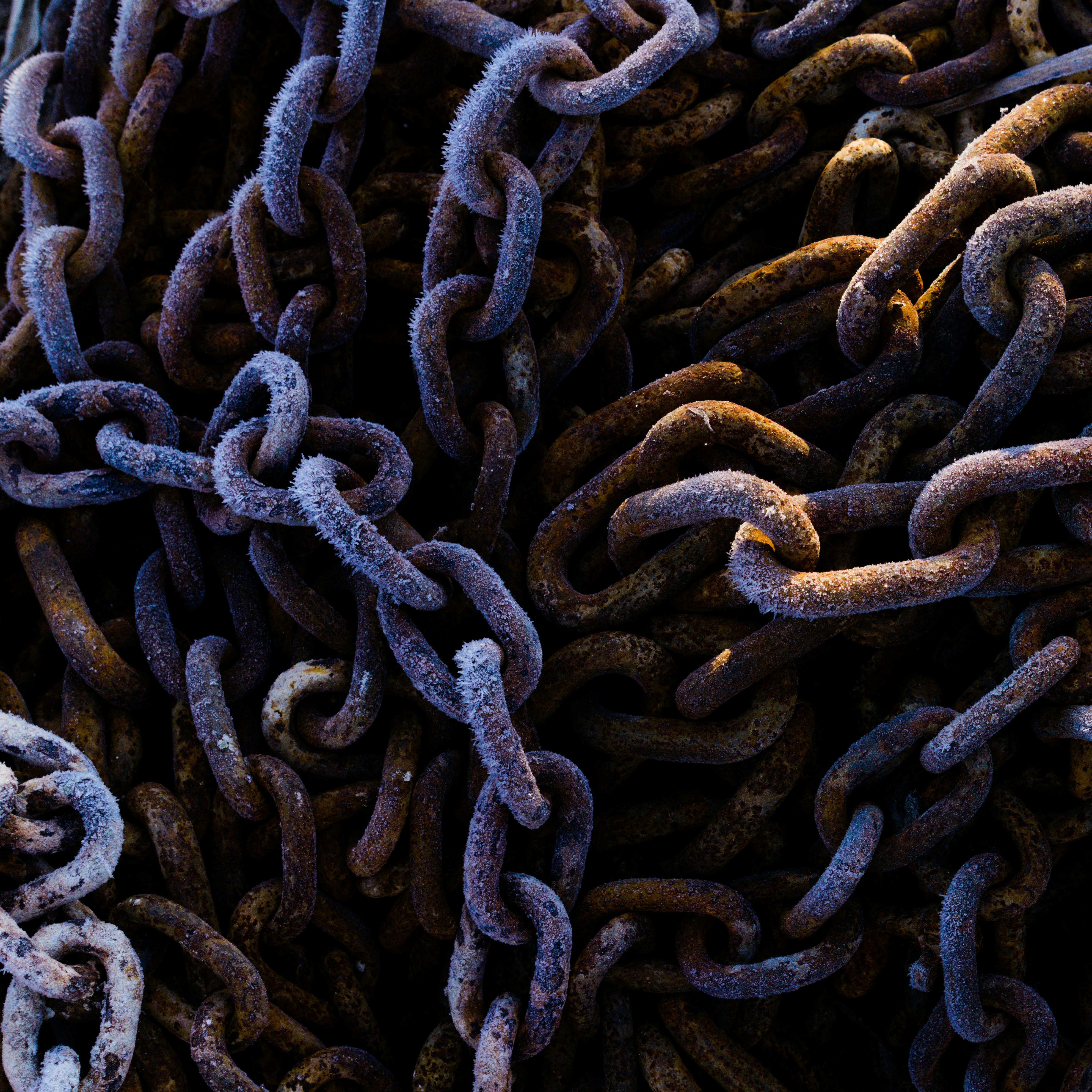 A bunch of chains that are stacked together photo – Free Wallpaper ...