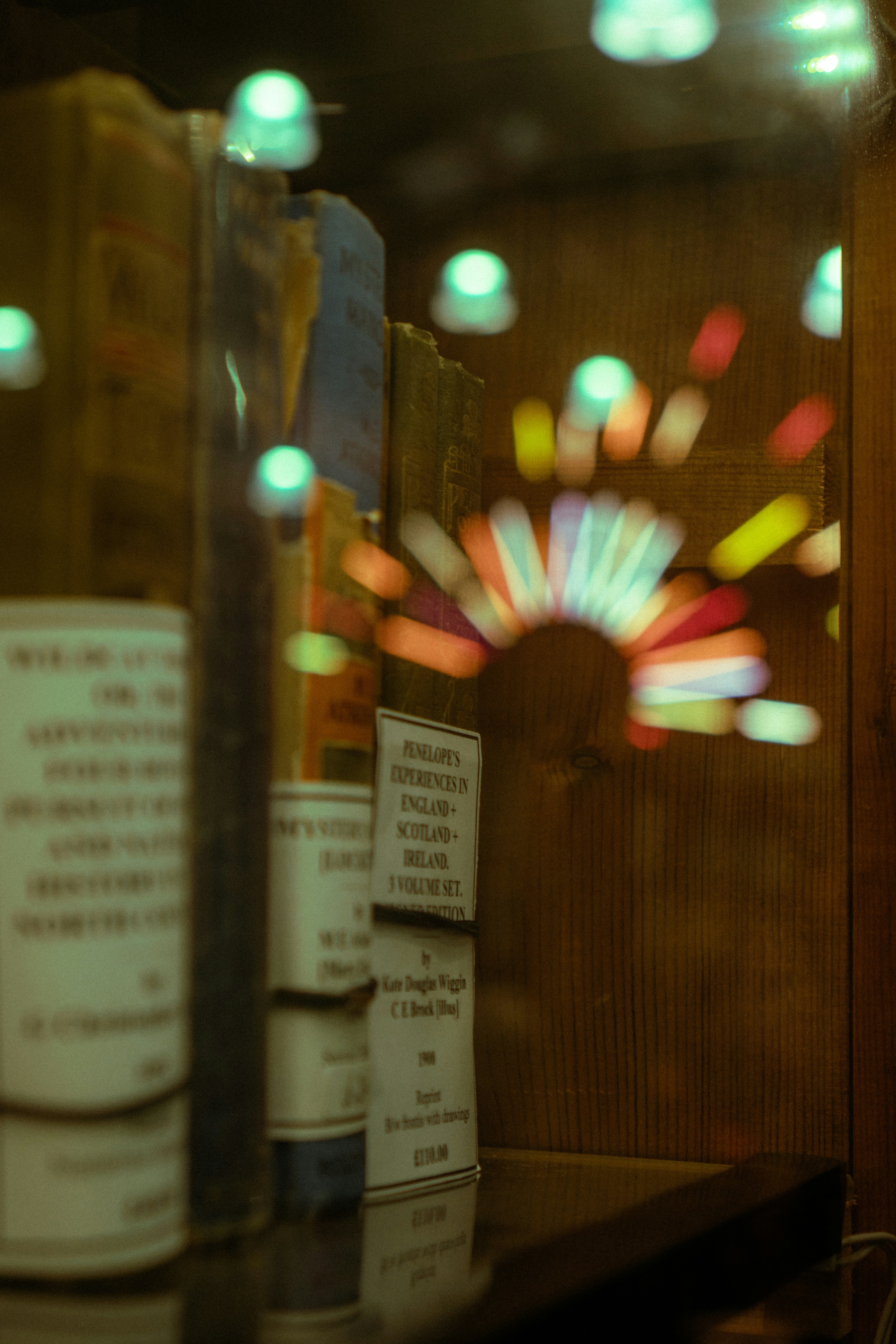 Neon-Glow in a Quiet Library of Colorful Spines