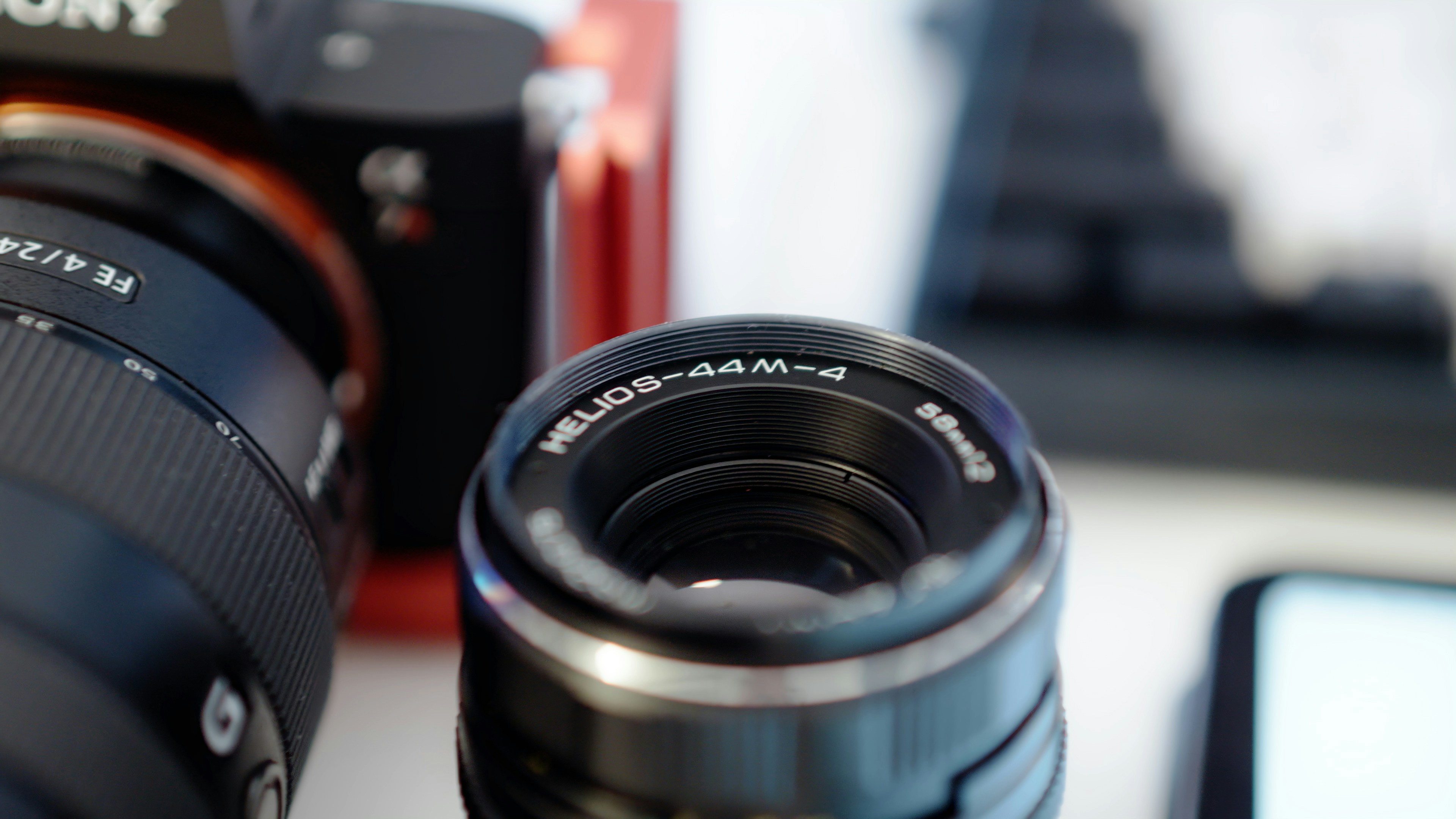 A close up of a camera and a cell phone photo – Free Background Image ...