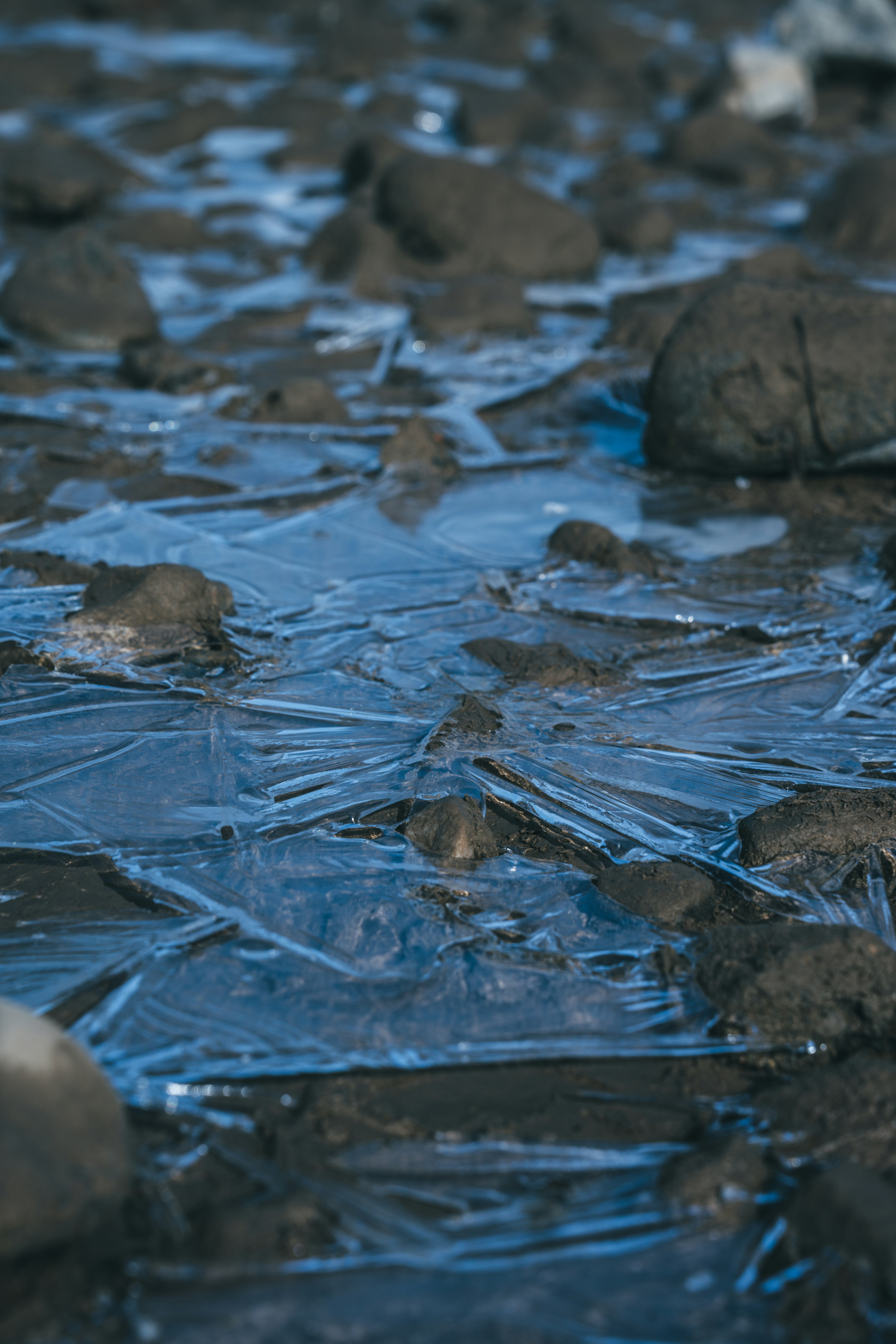 A close up of rocks and water with ice on them photo – Free Ice Image ...