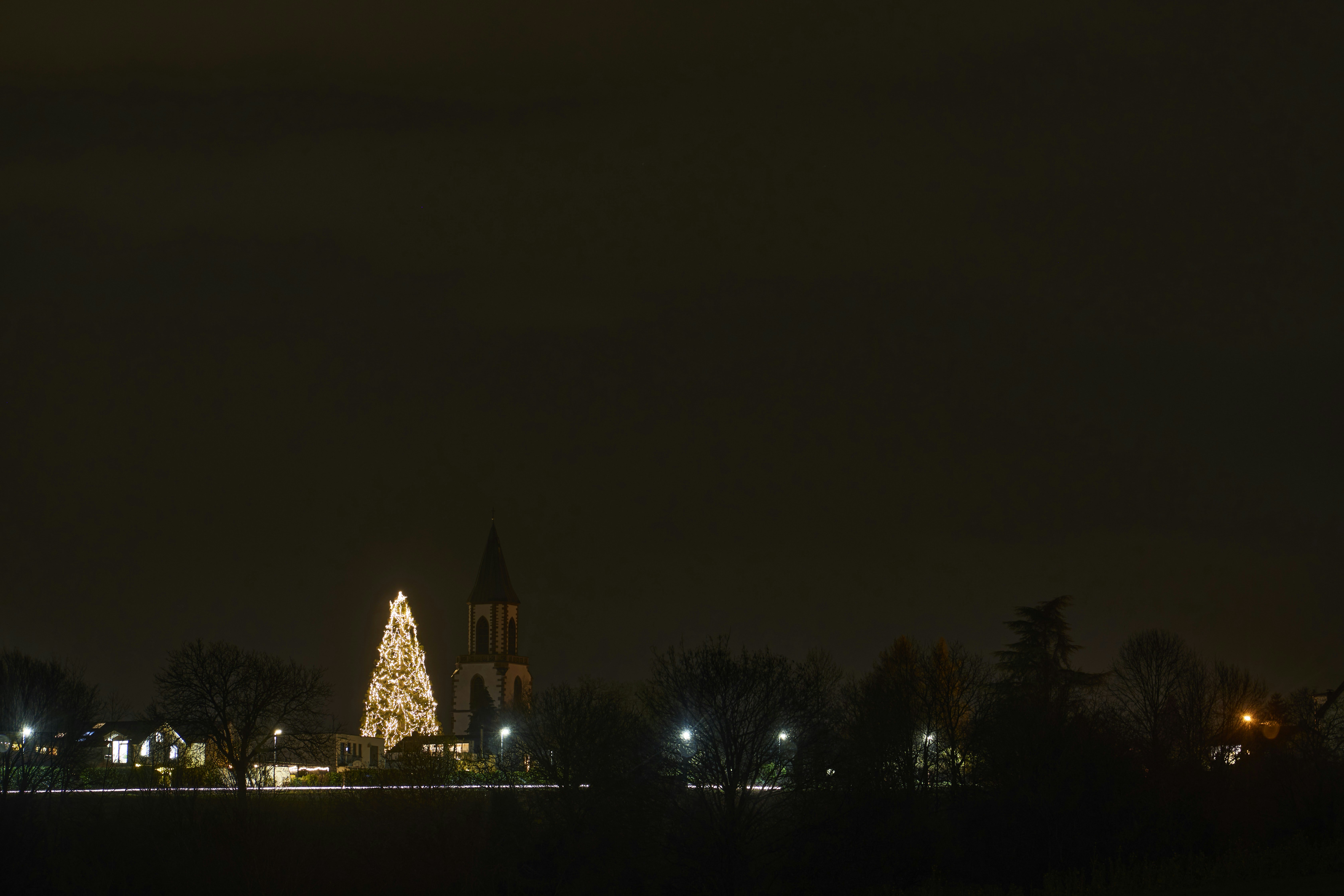 A view of a city at night from across the water