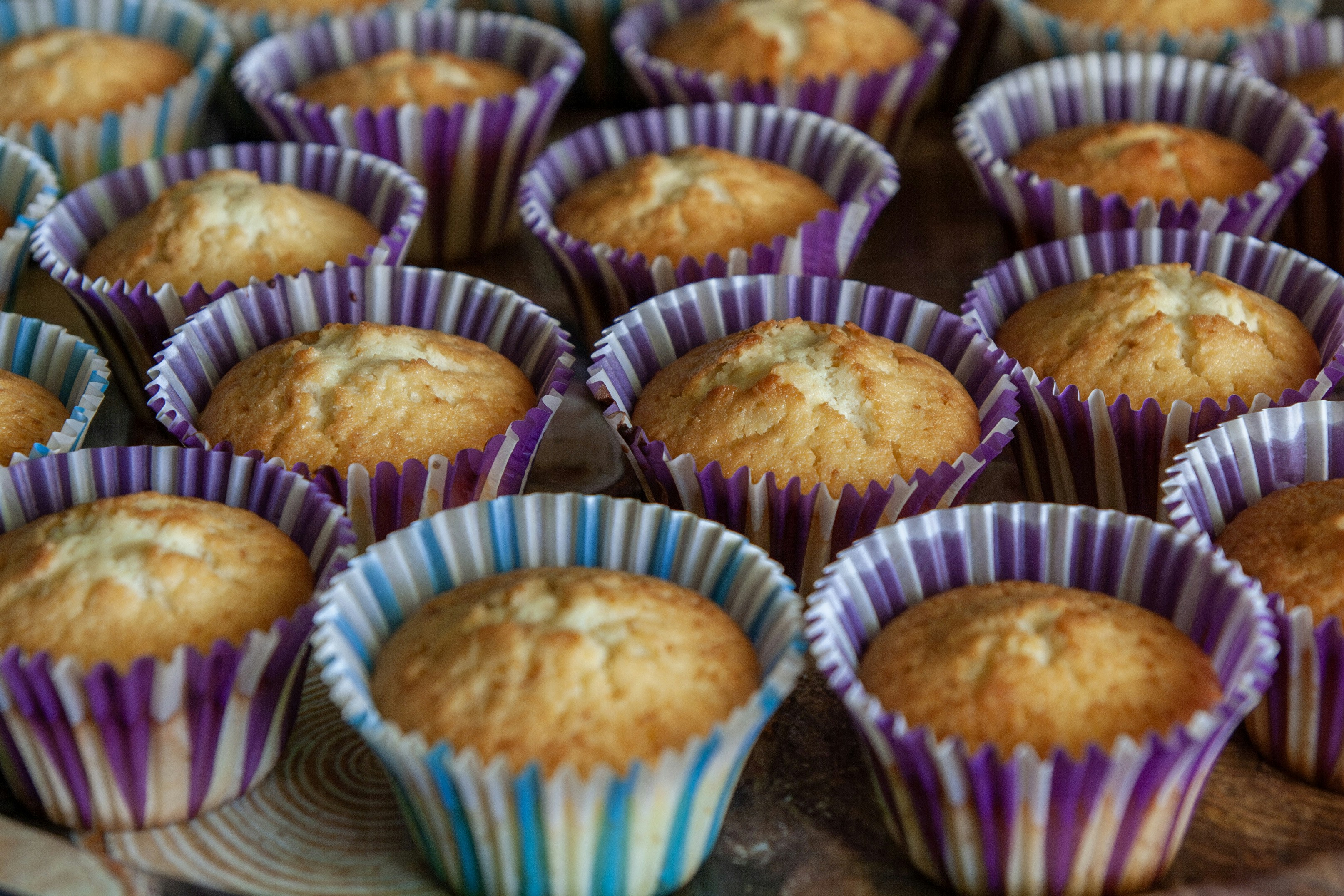 A bunch of muffins that are sitting on a table photo – Free Dessert ...