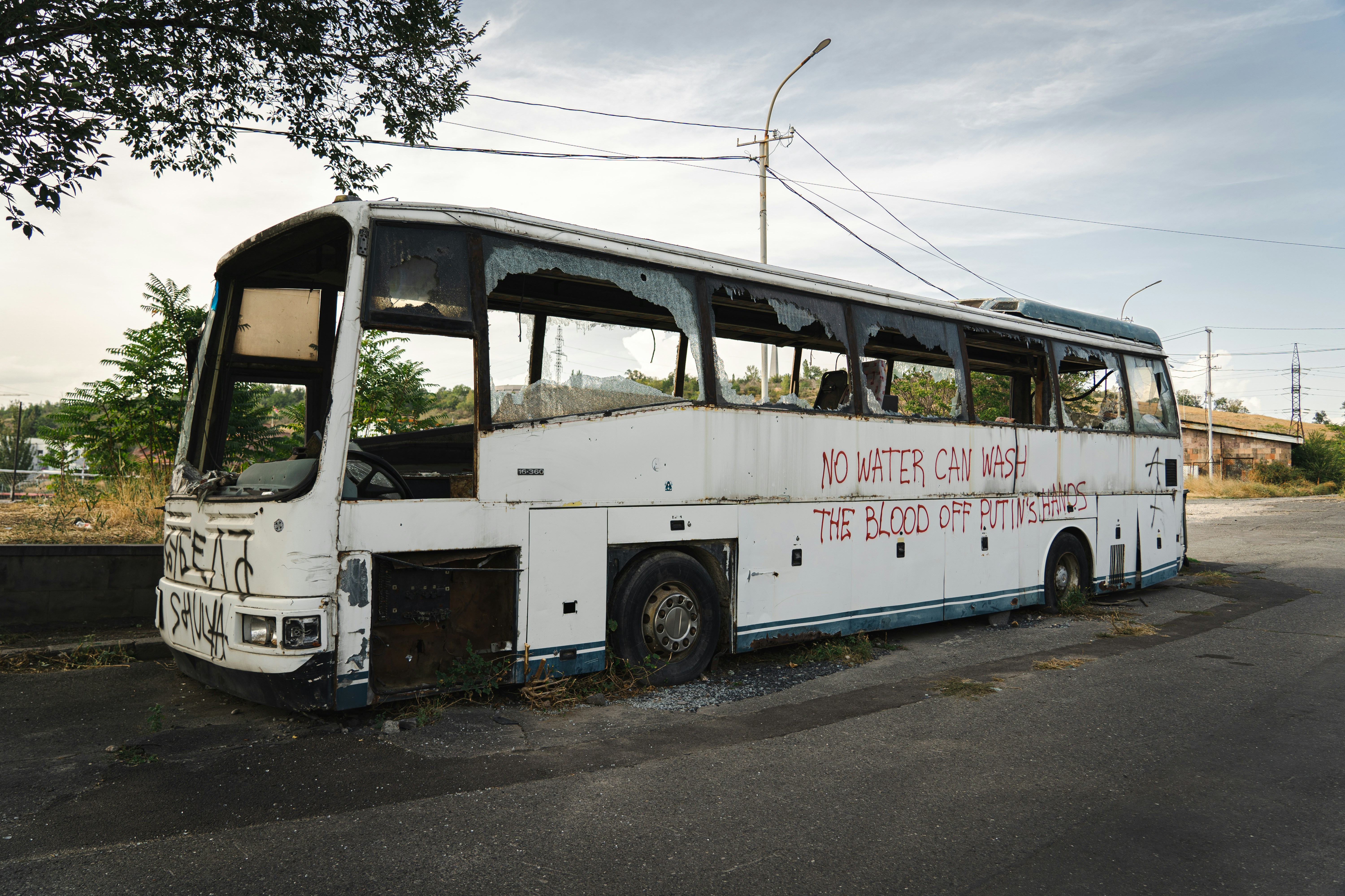 A white bus parked on the side of the road photo – Free Yerevan Image ...