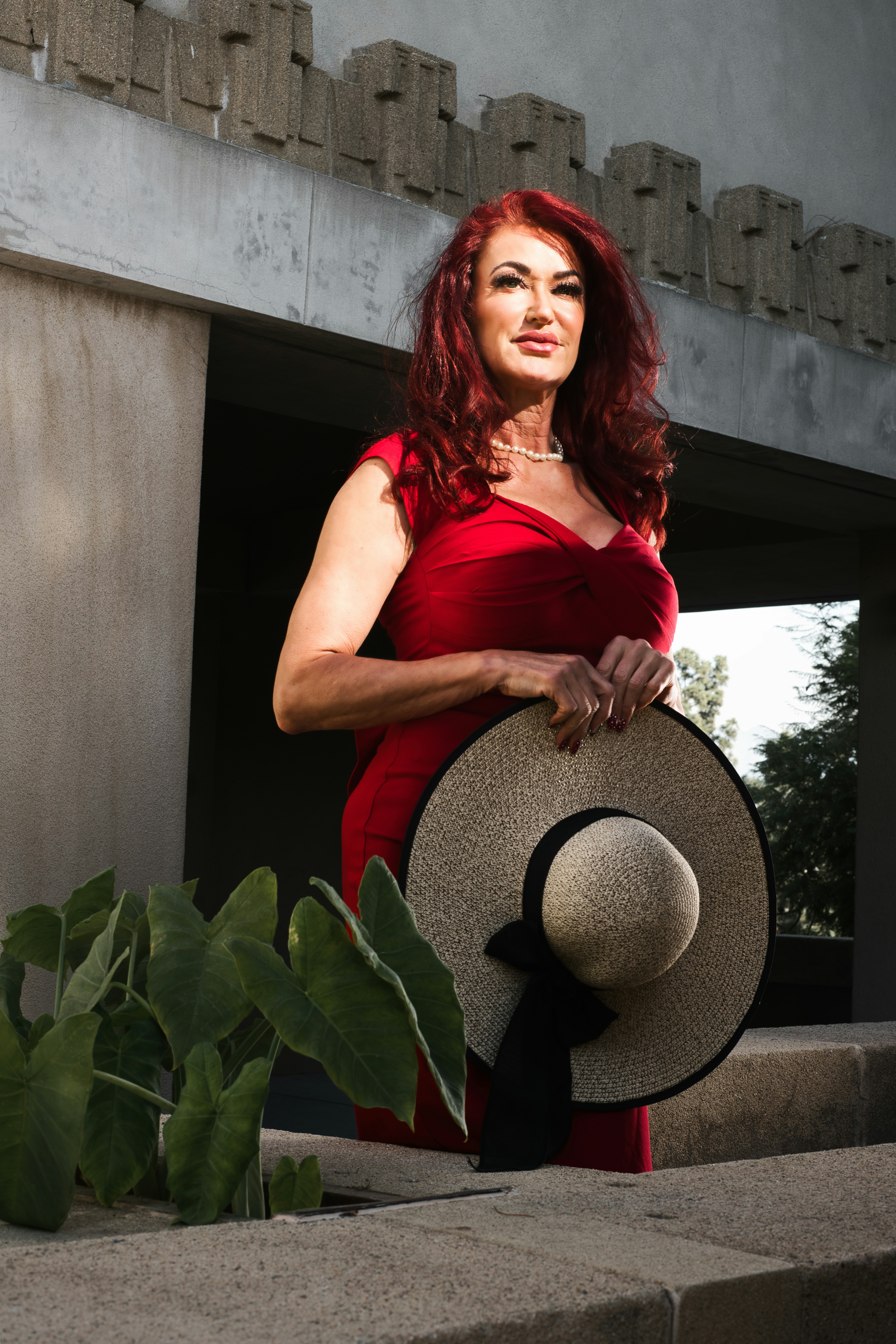 Crimson Confidence Under Urban Concrete
