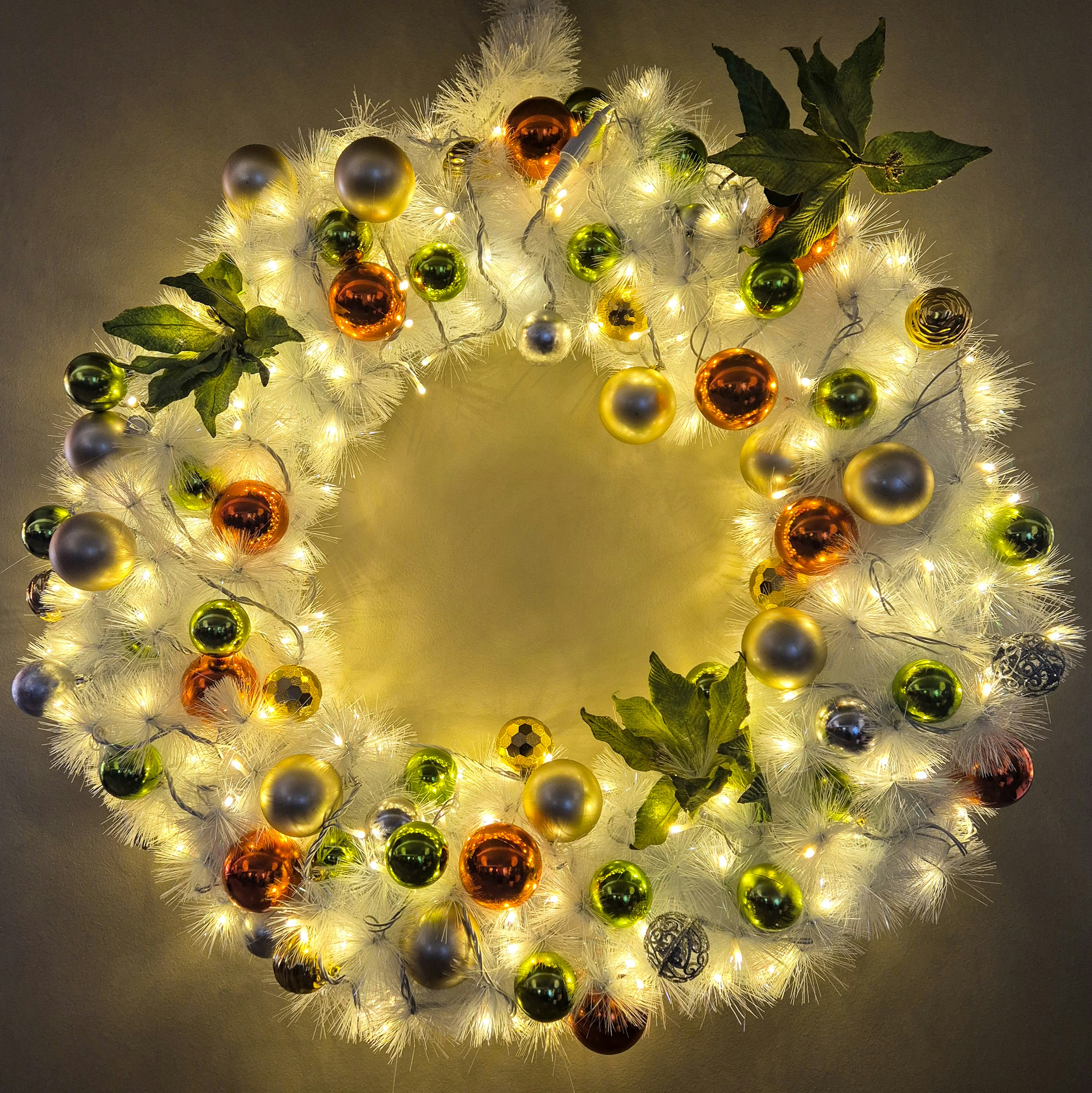 Circular Glow: Festive Lights Framing a Wreath