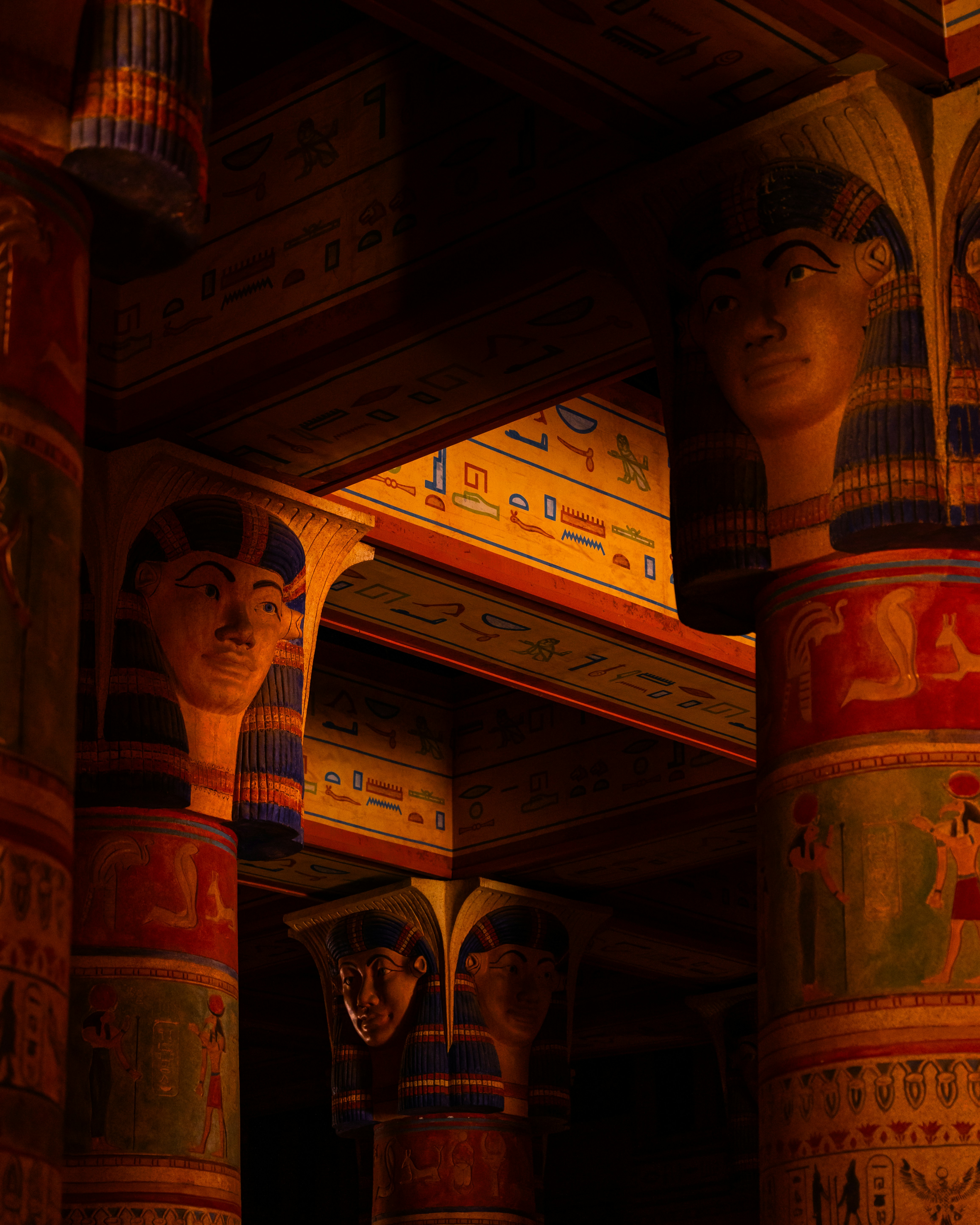 A room filled with lots of colorful columns photo – Free Atlas studios ...