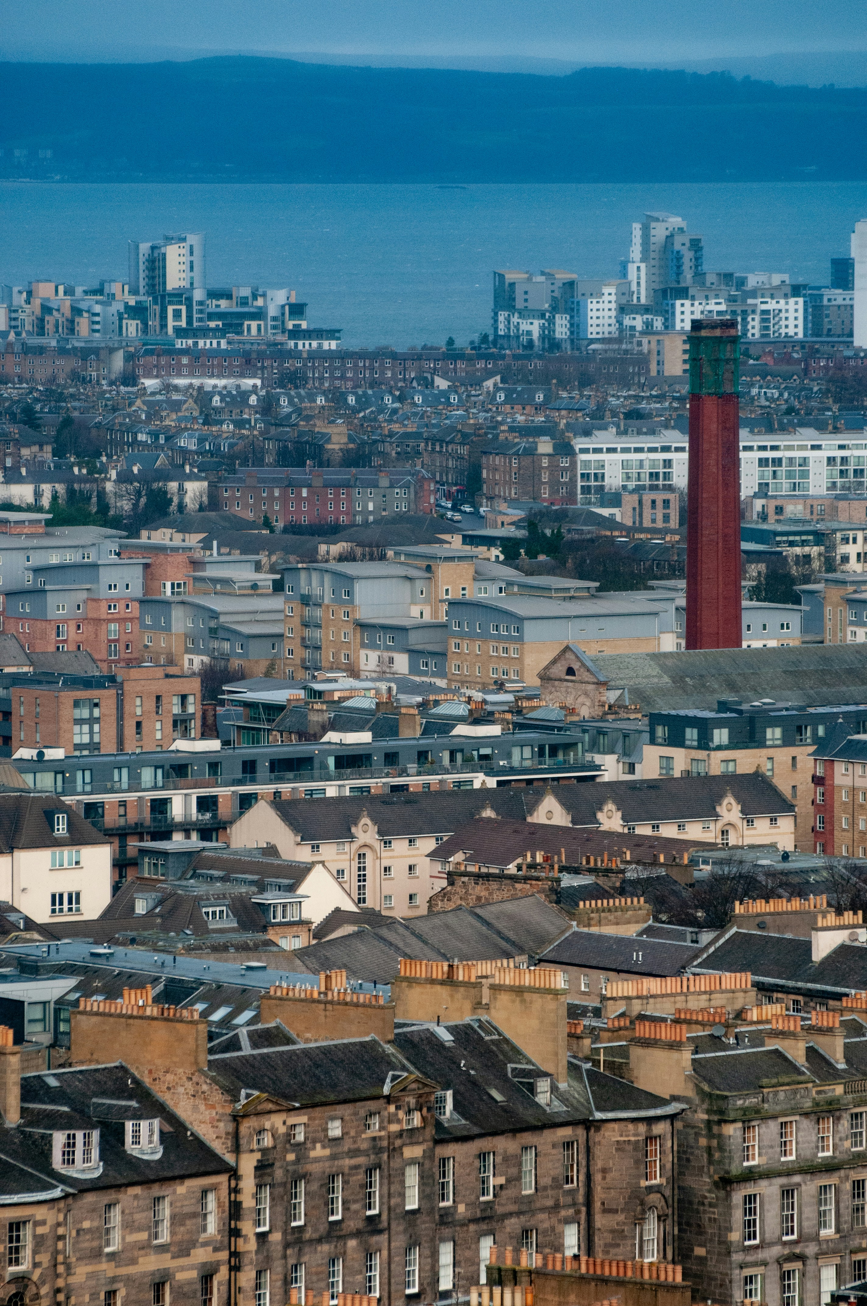 A view of a city from a tall building photo – Free Car Image on Unsplash