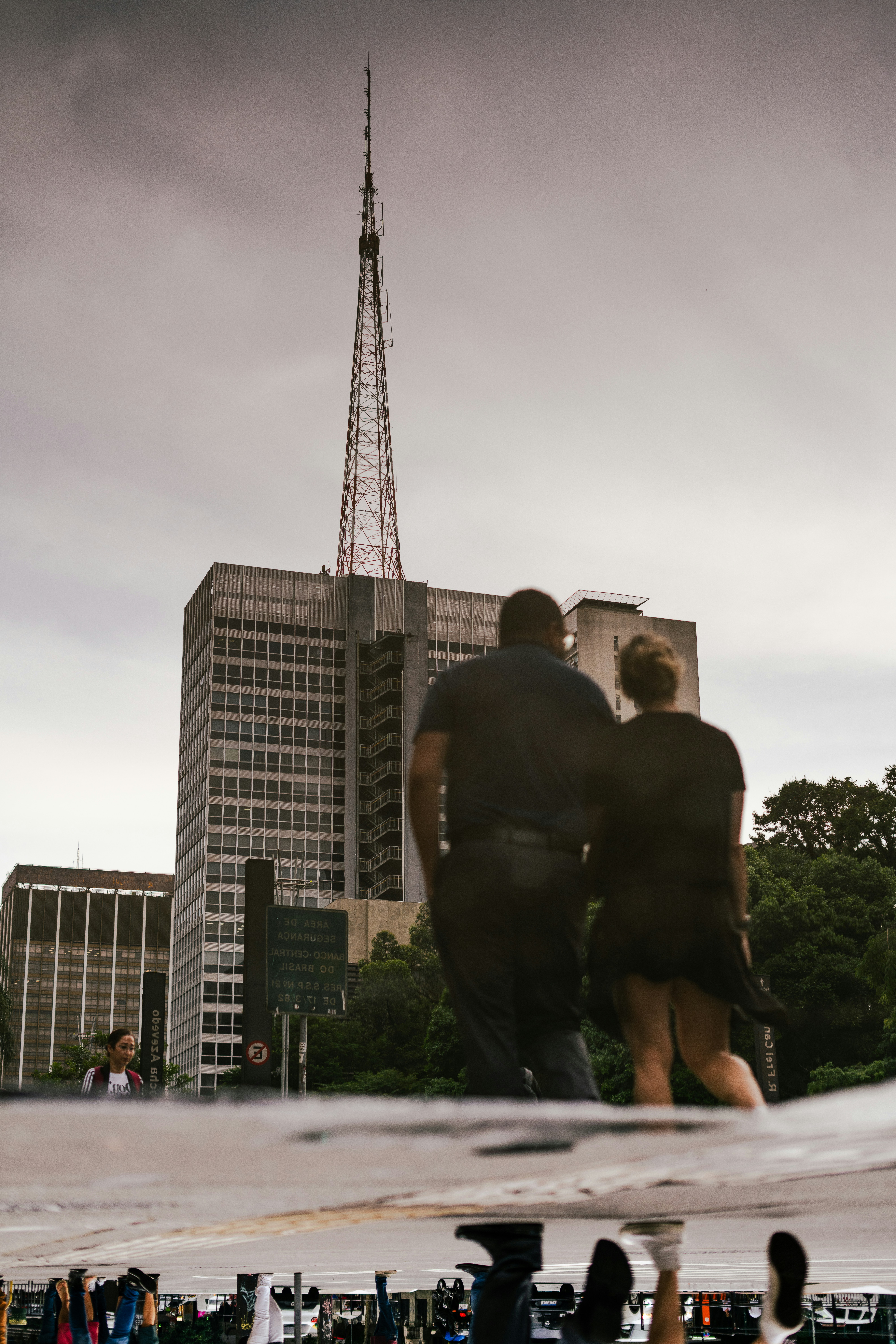 Toward the Tower: Echoes of a Rain-Washed City Street