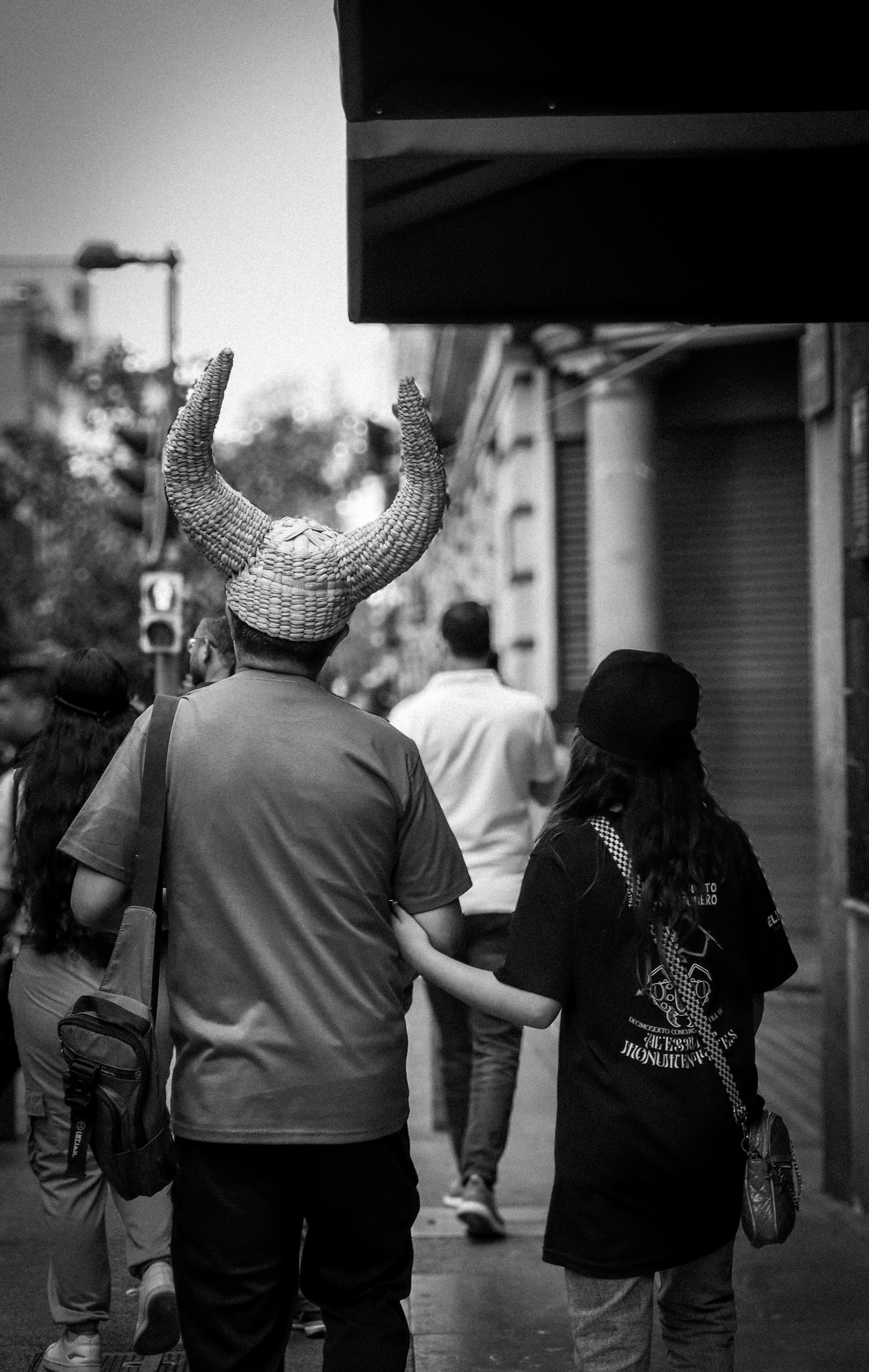 Twin Horns on the Street: Anointing the Crowd with Quiet Presence
