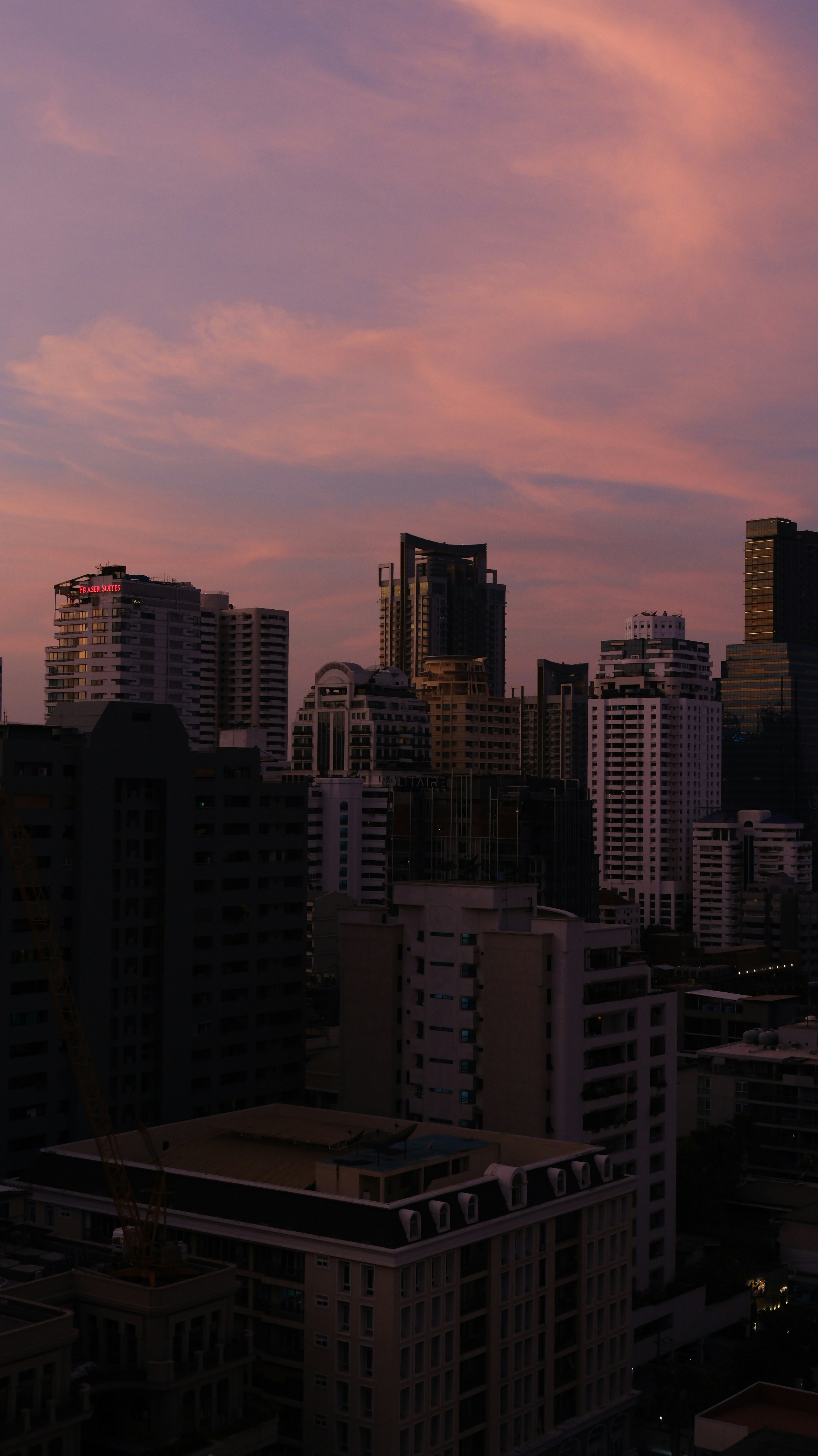 Crimson Dusk Over a Concrete Skyline