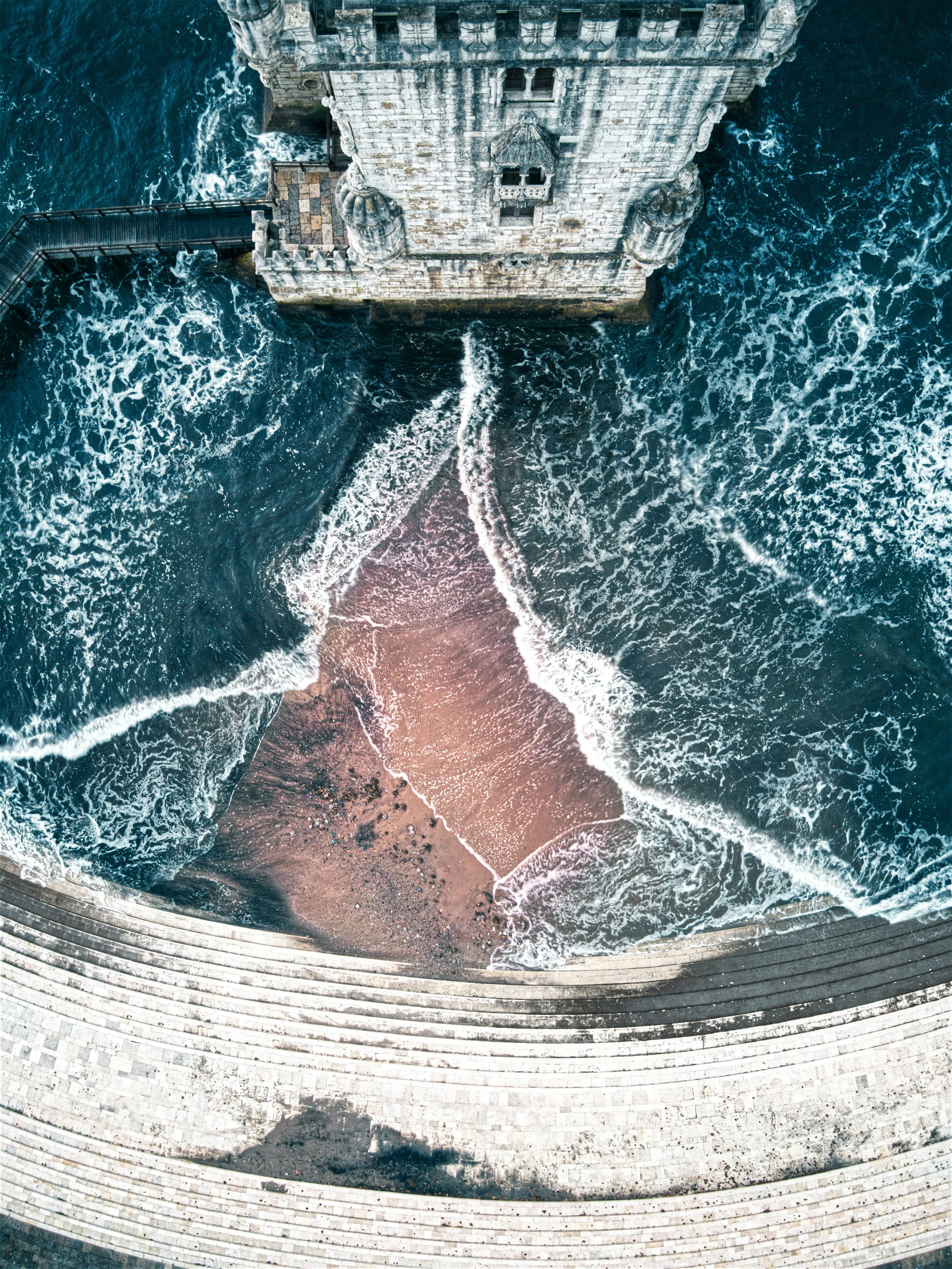 Tidal Embrace: The Dance of Waves and Stone