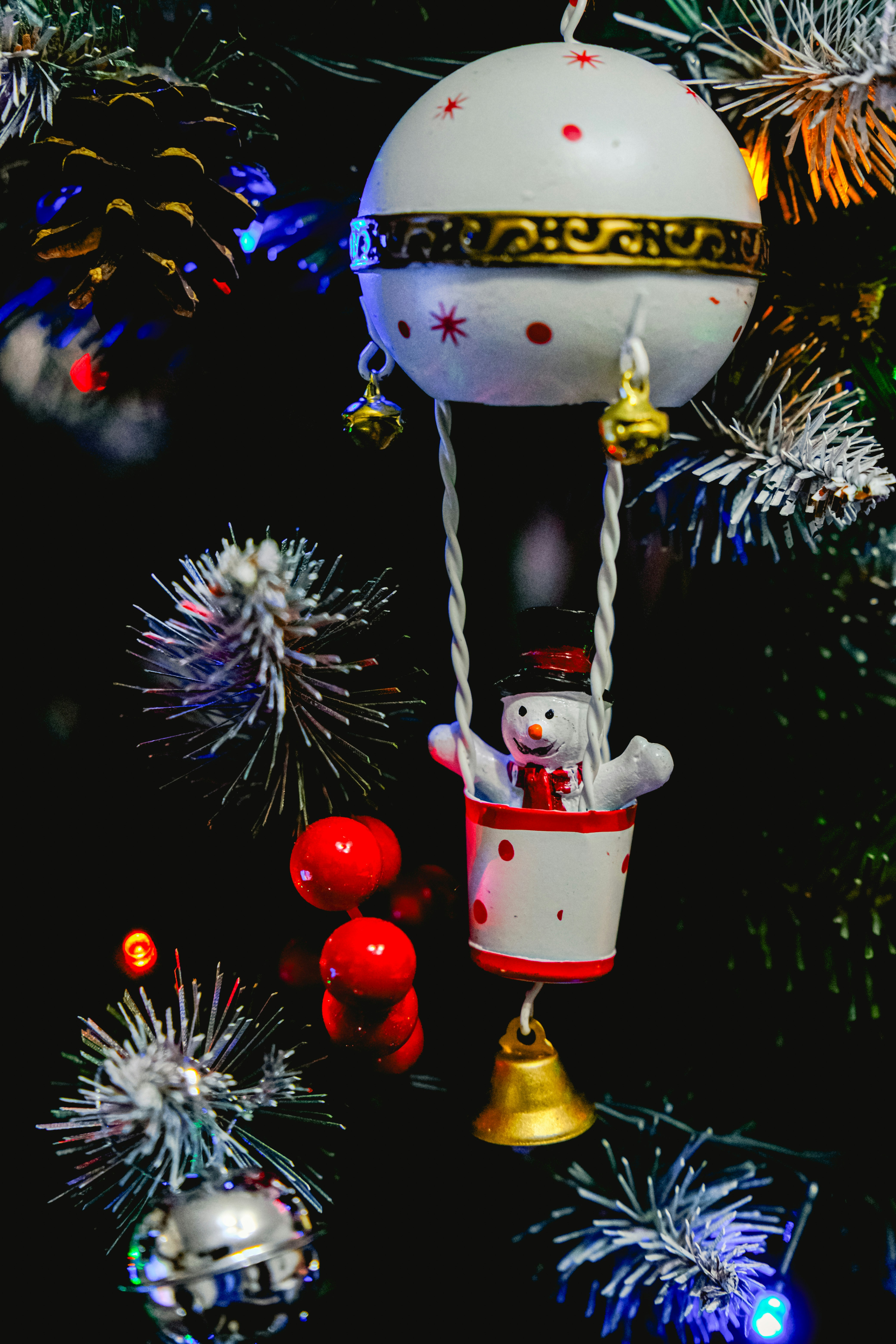 Tiny Snowman Floats Inside a Hanging Christmas Globe