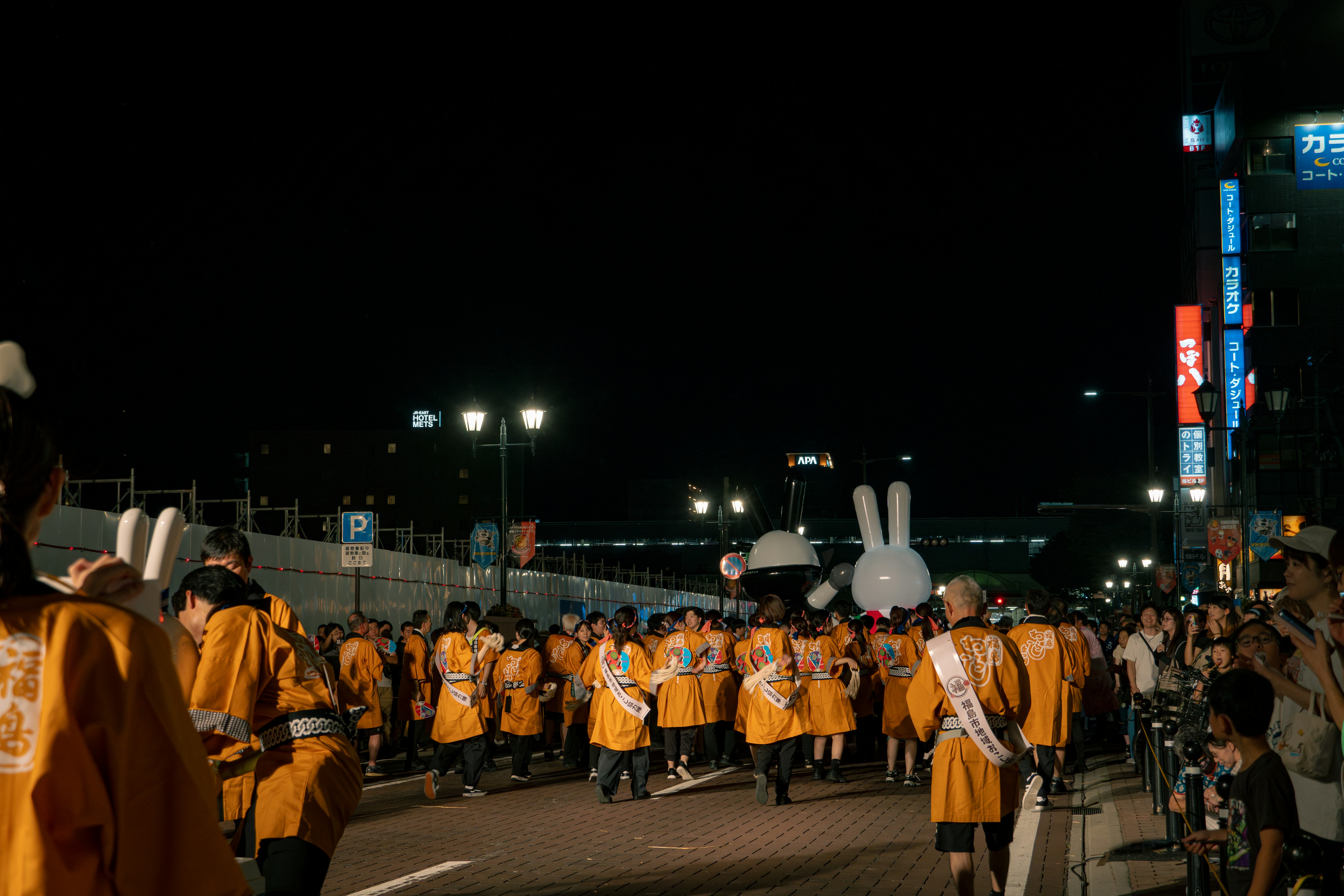 A large group of people in yellow uniforms photo – Free Man Image on ...