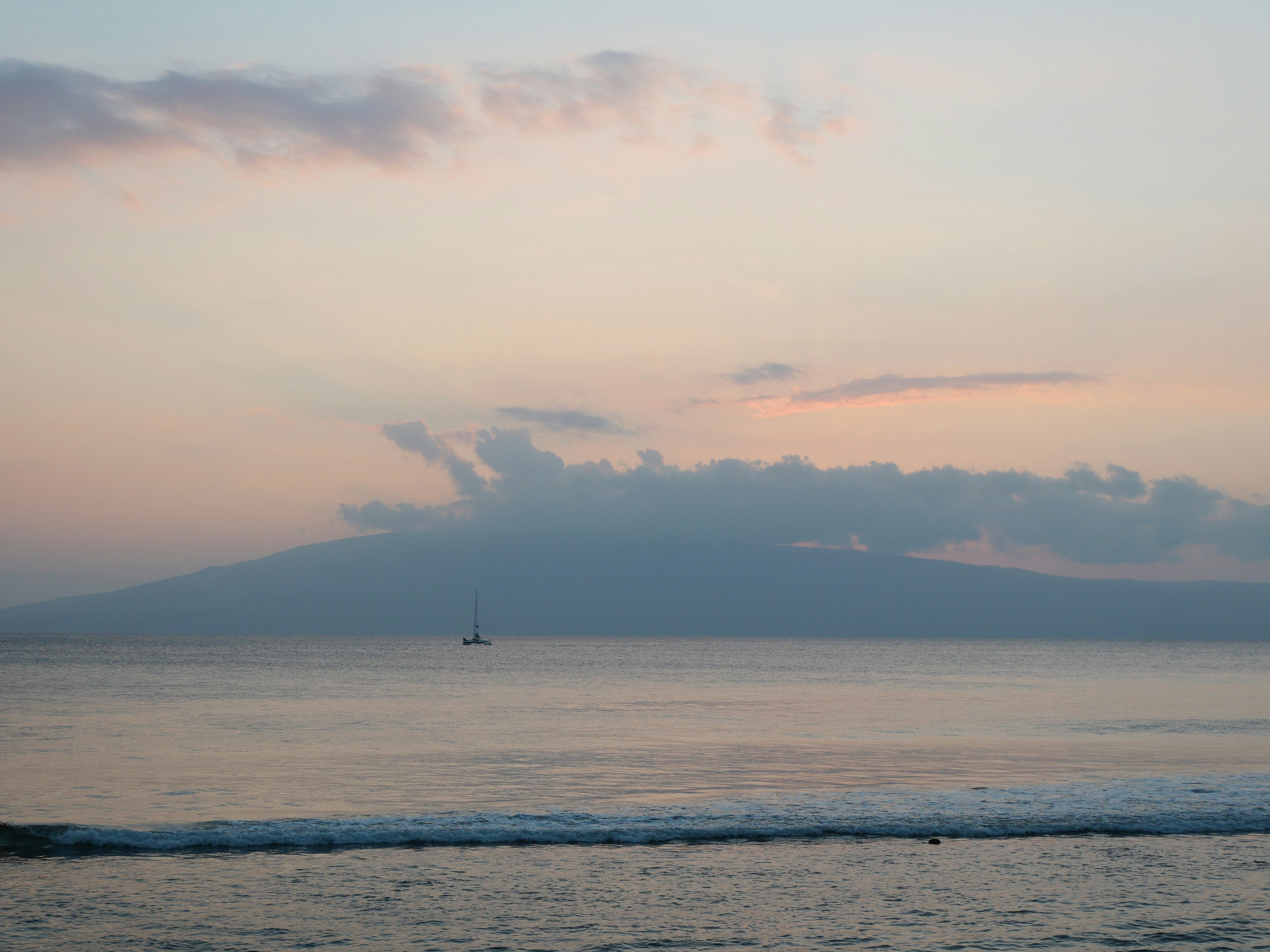 A view of the ocean with a sailboat in the distance photo – Free Nature ...