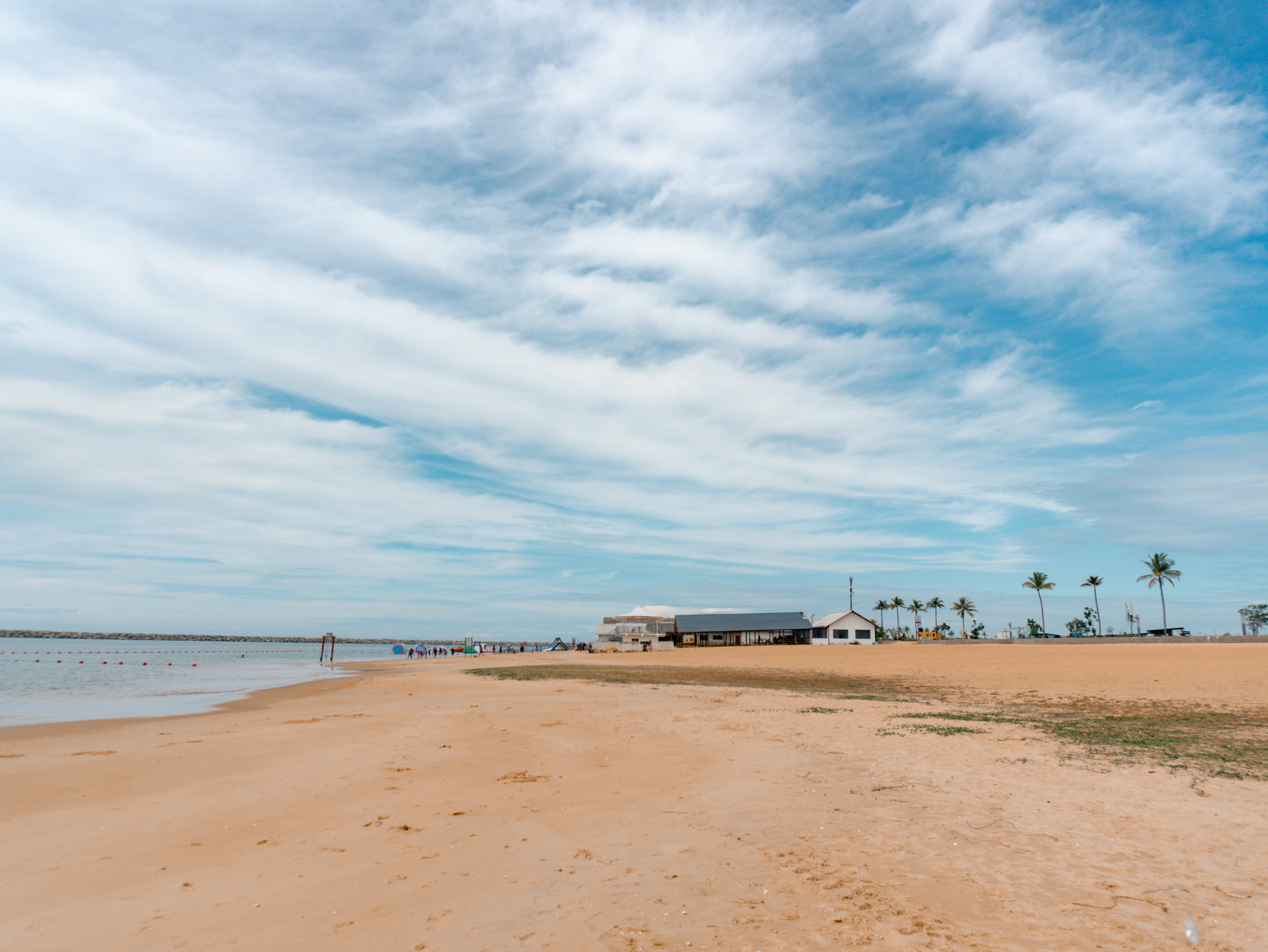 Golden Sands Meet Azure Skies