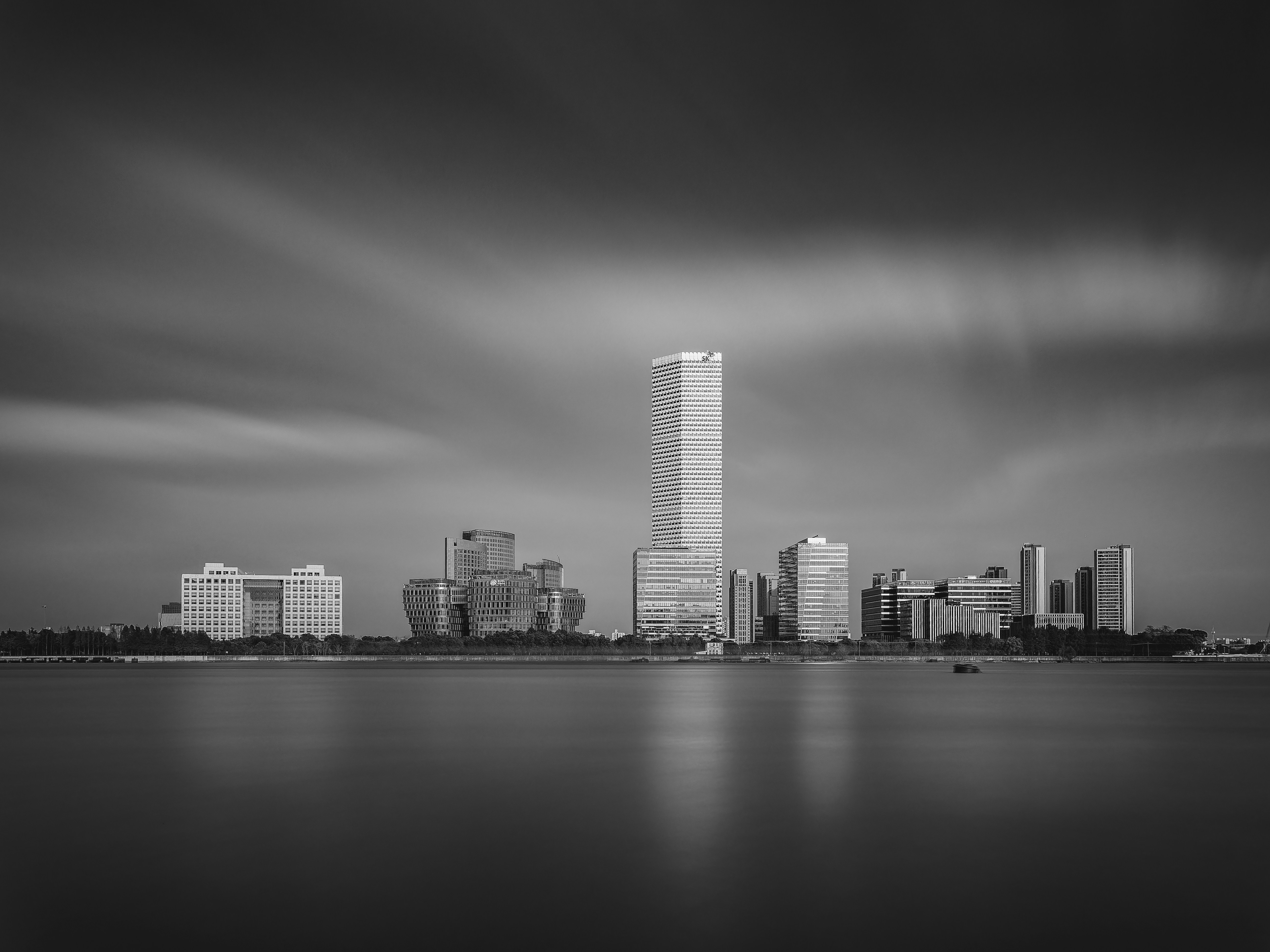 A black and white photo of a city skyline