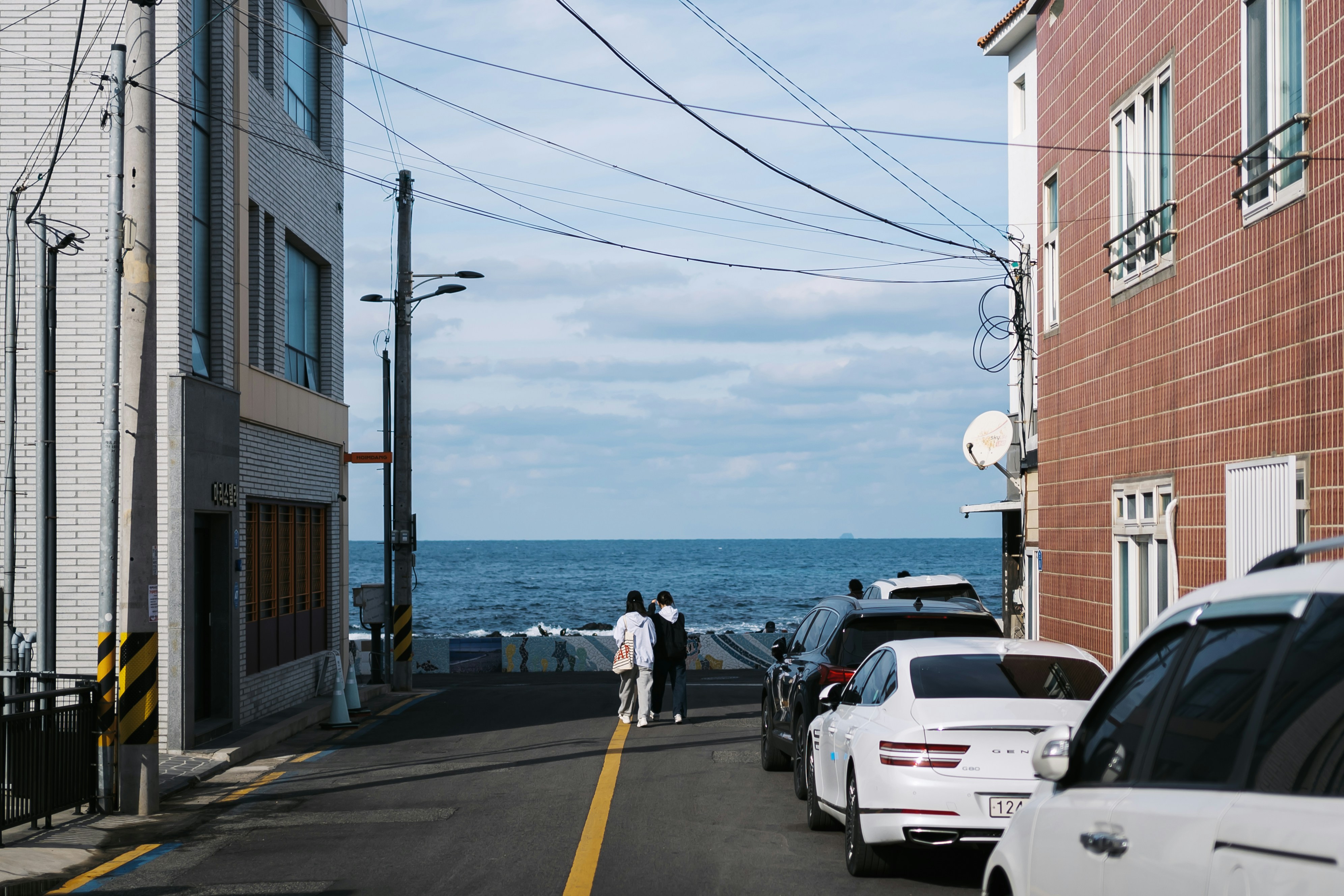 Harbor Bound: A Sunlit Street Toward the Sea