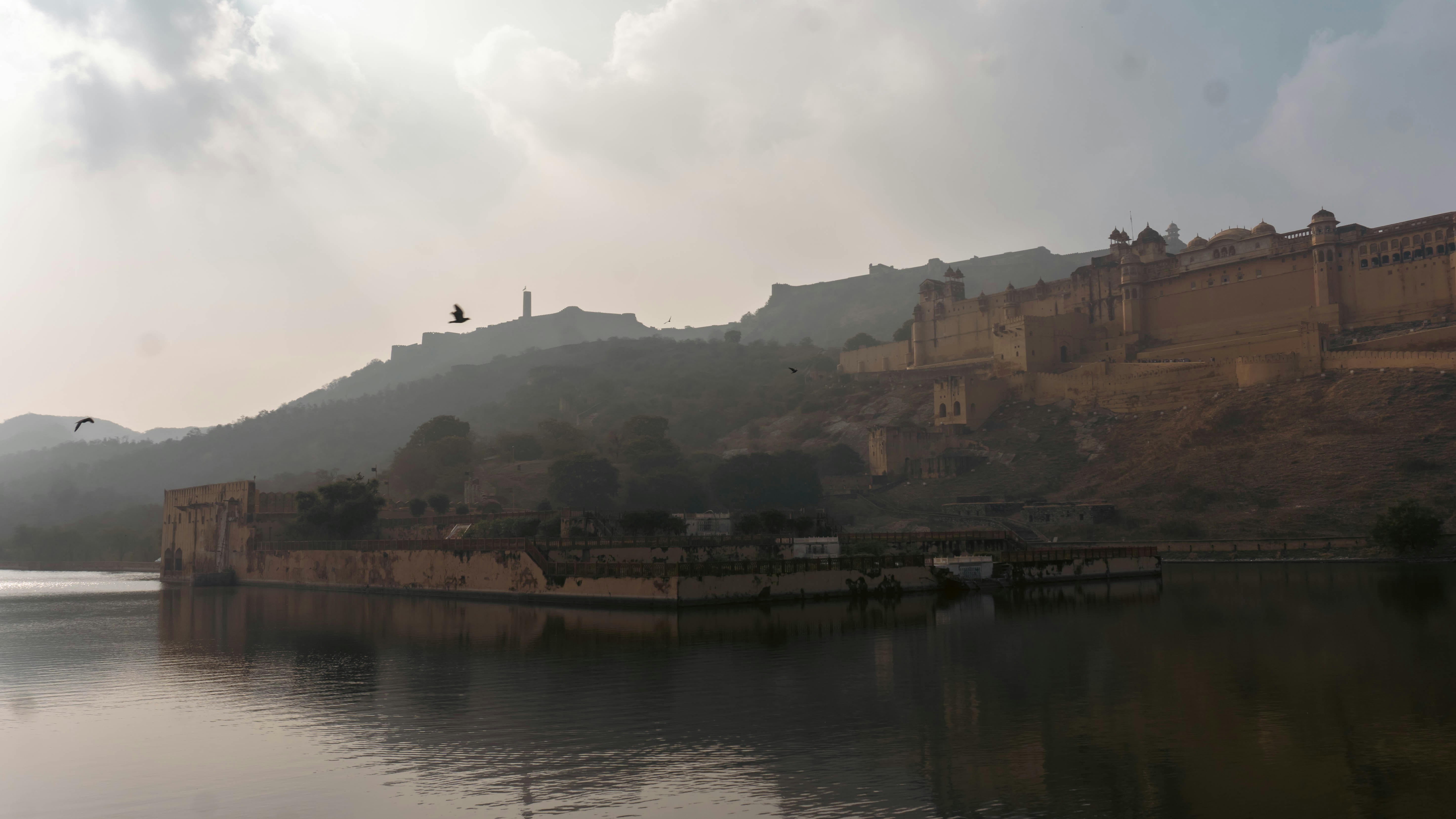 Ridge Citadel at Dusk: Silent Fort Above a Reflective River