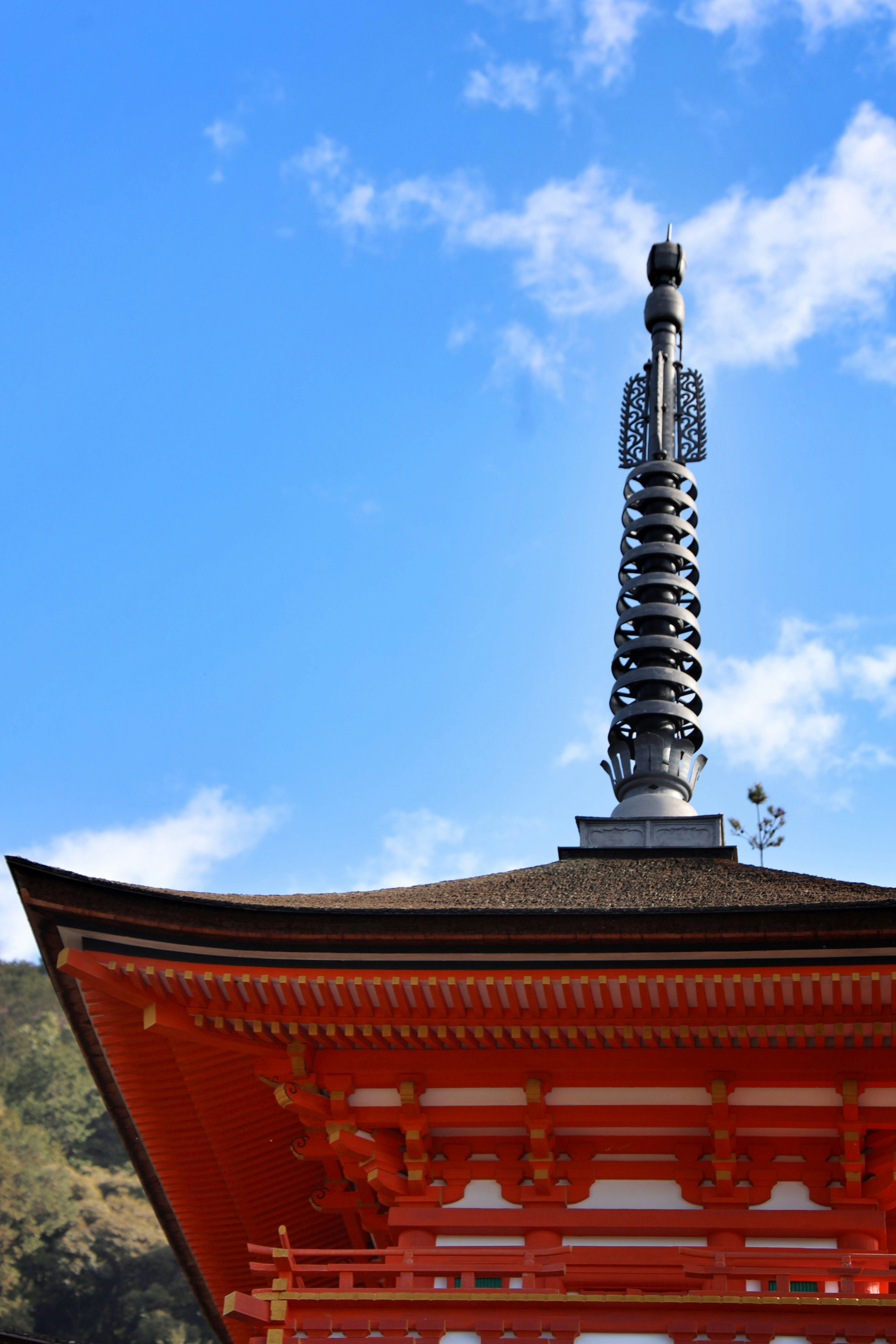 A tall red building with a sky background photo – Free Kyoto Image on ...