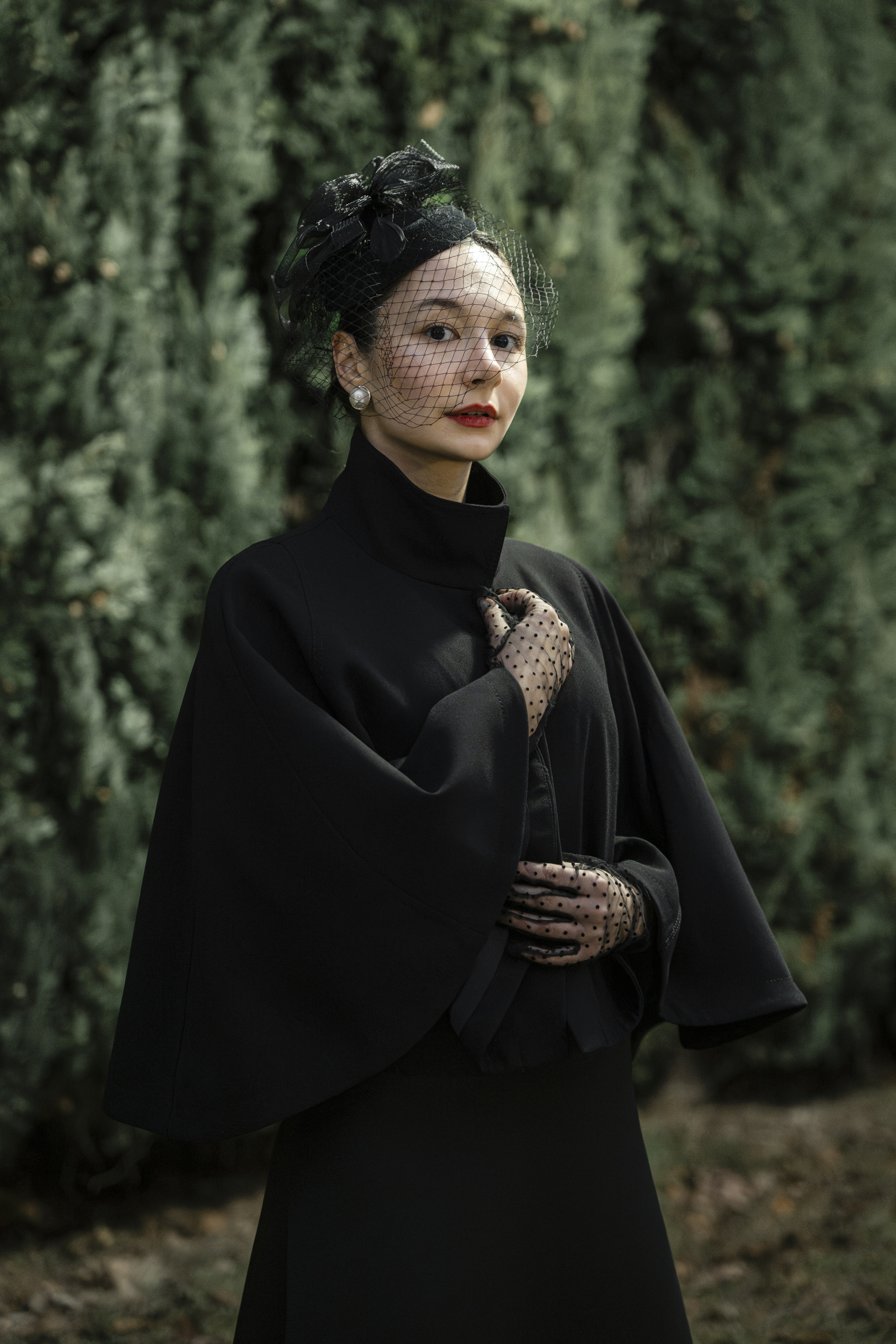 Noir Velvet Portrait: Quiet Glamour Amid Evergreen
