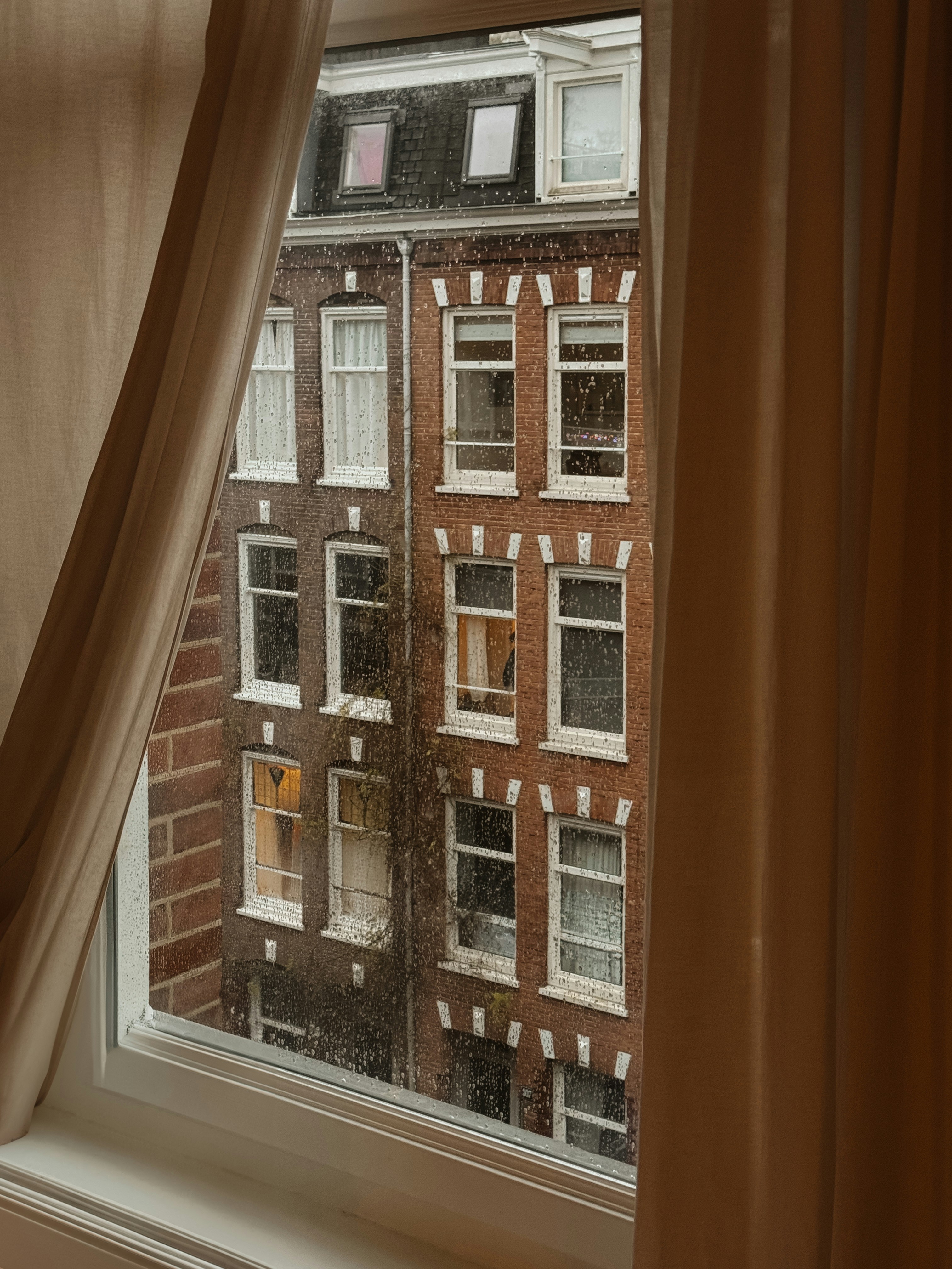 A view of a building from a window photo – Free Amsterdam Image on Unsplash