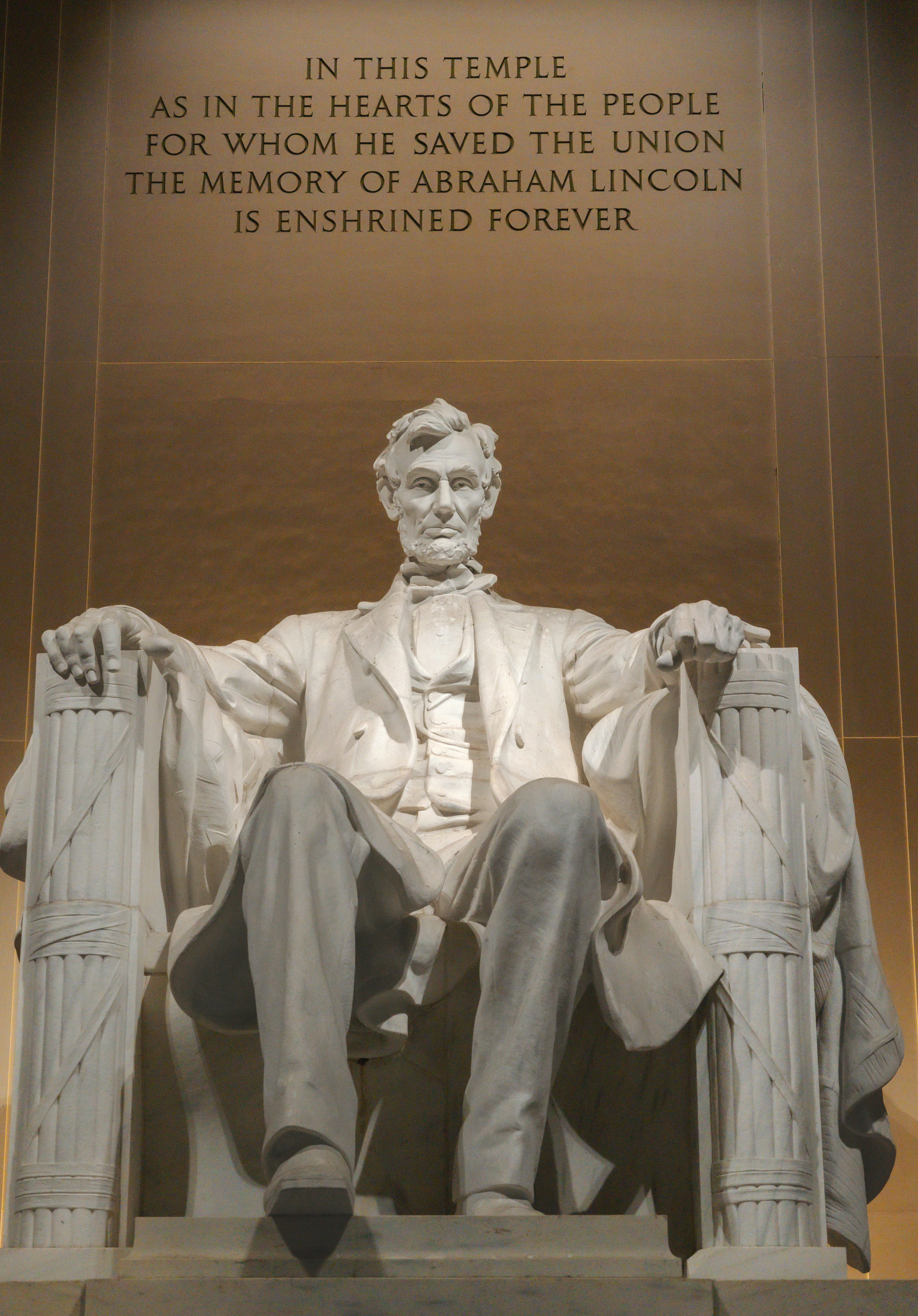 The Marble Seated Figure: Quiet Authority in a Hall of Remembrance