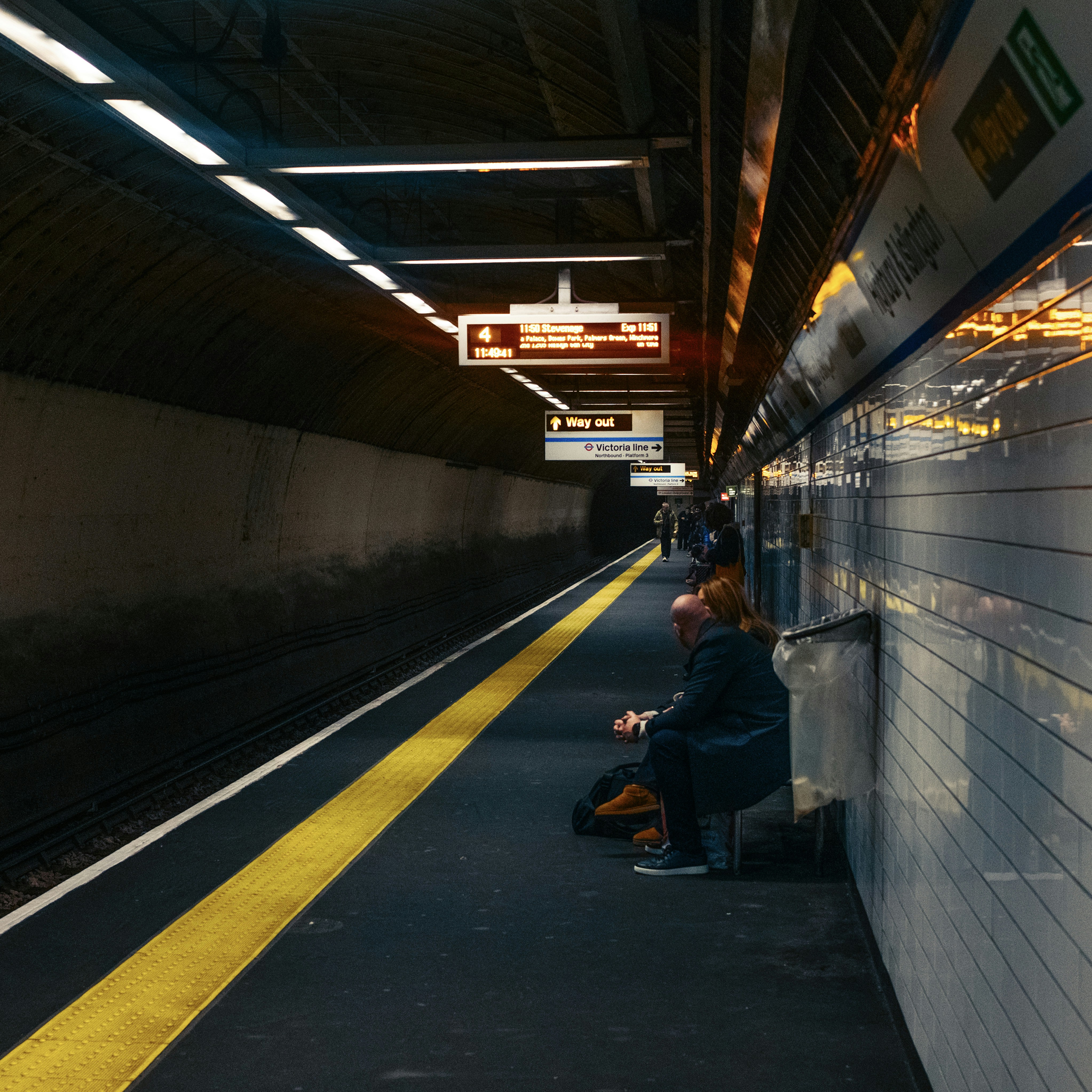 The Yellow Line Reverie: Quiet Platform Portrait