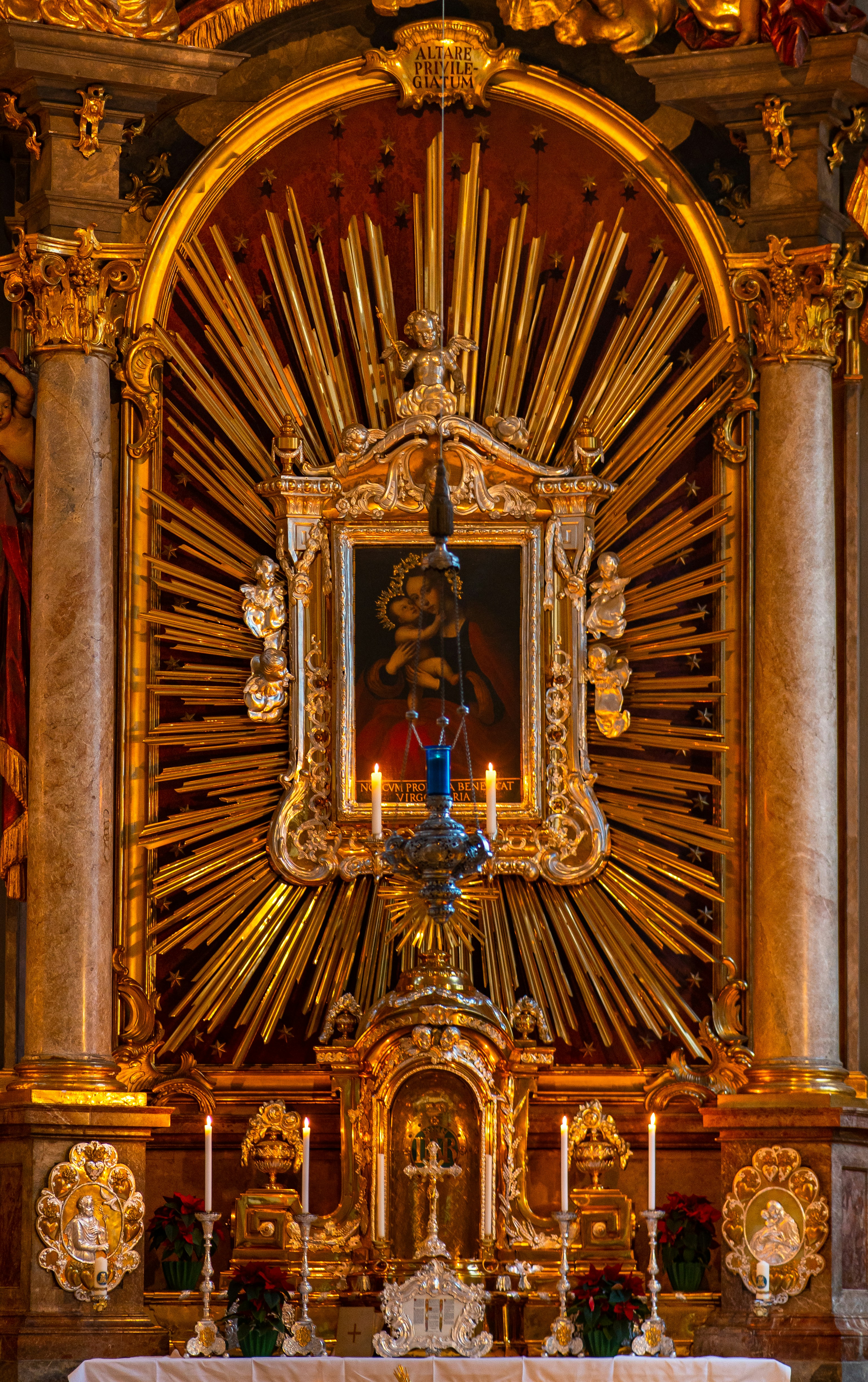 A gold alter with candles in front of it photo – Free Munich Image on ...