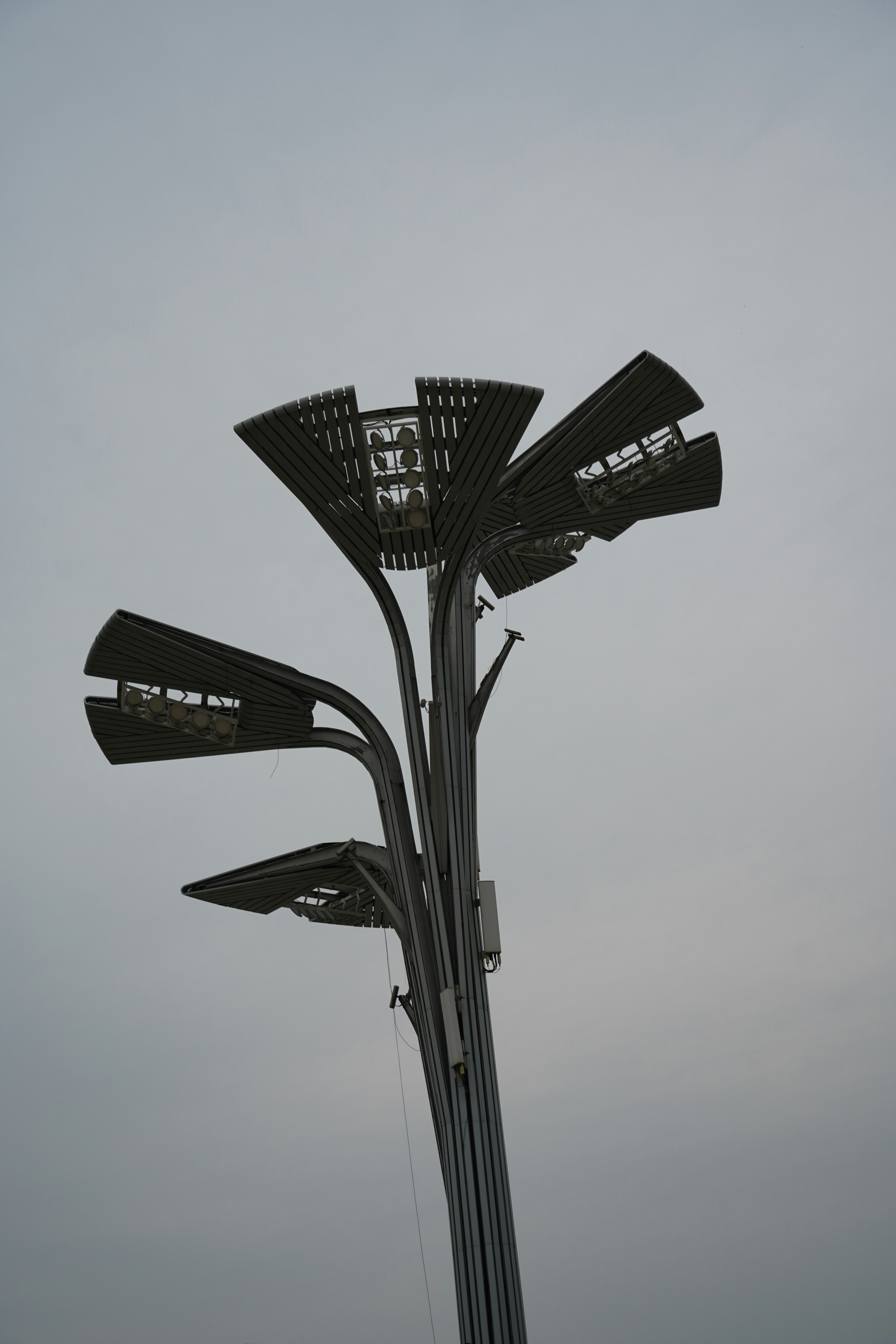Arms of Light: A Modular Streetlight Reaching Into the Overcast Sky