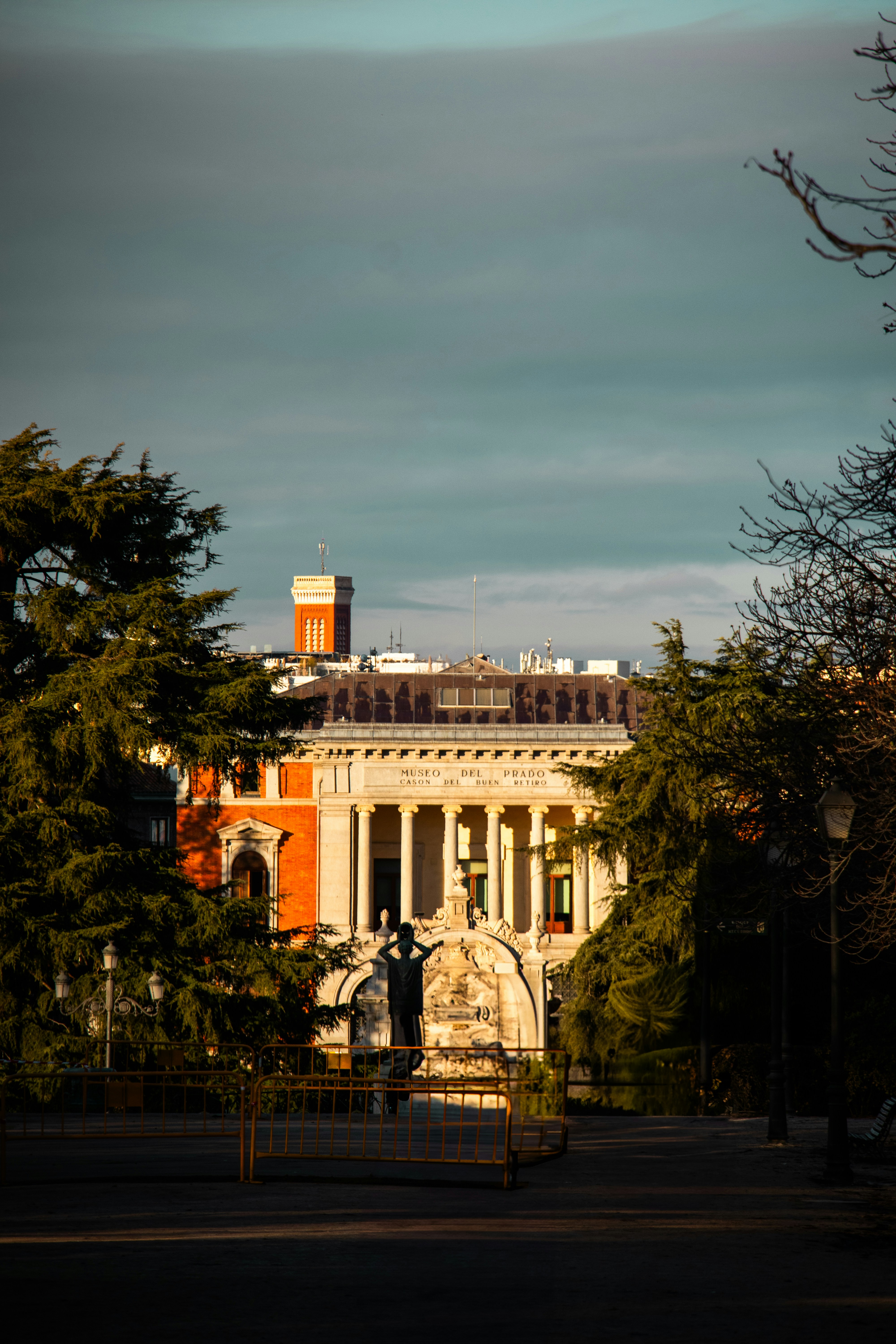 A large building with a clock tower on top of it photo – Free Building ...