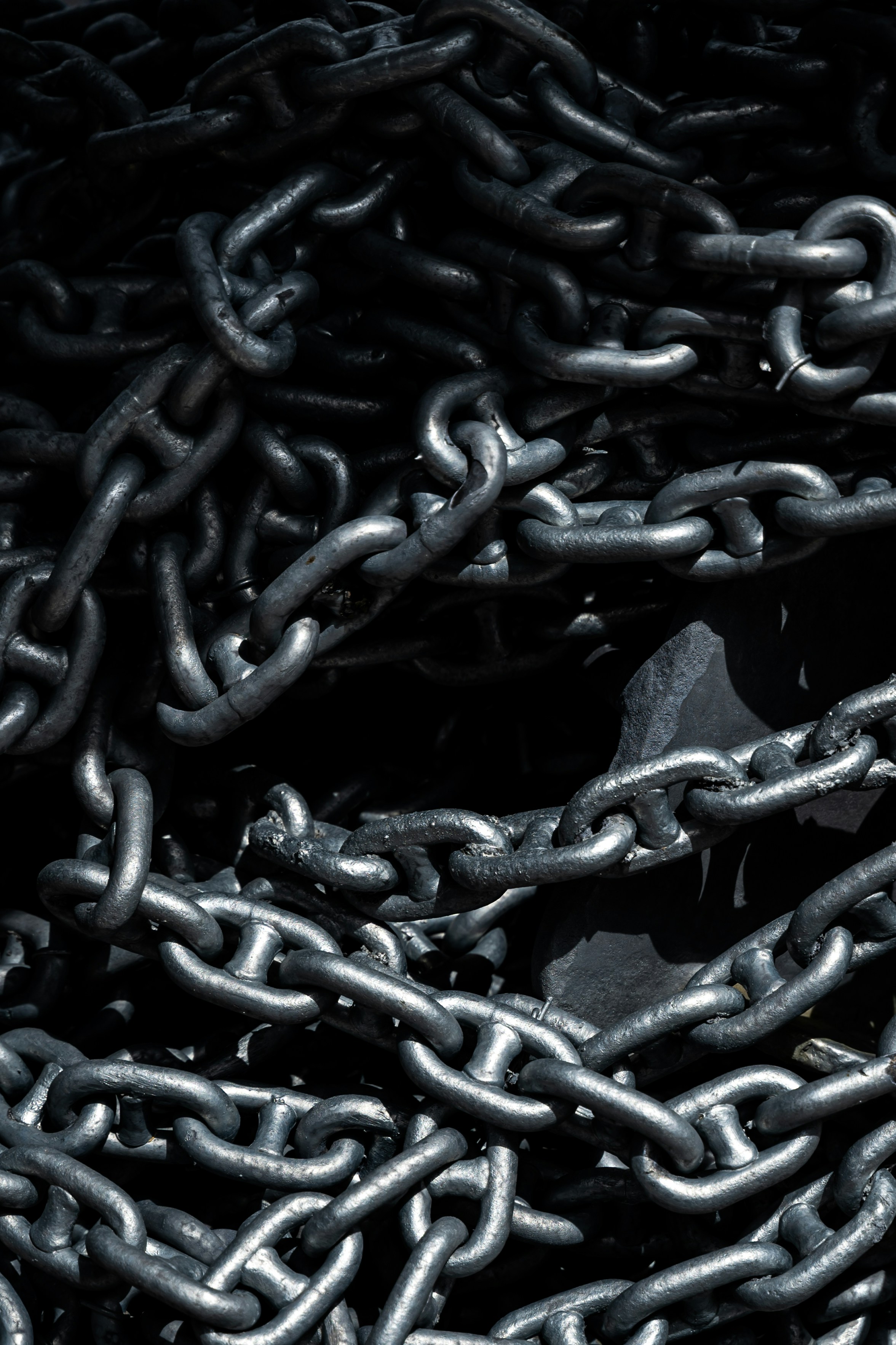 A bunch of chains that are laying on the ground photo – Free Chain ...