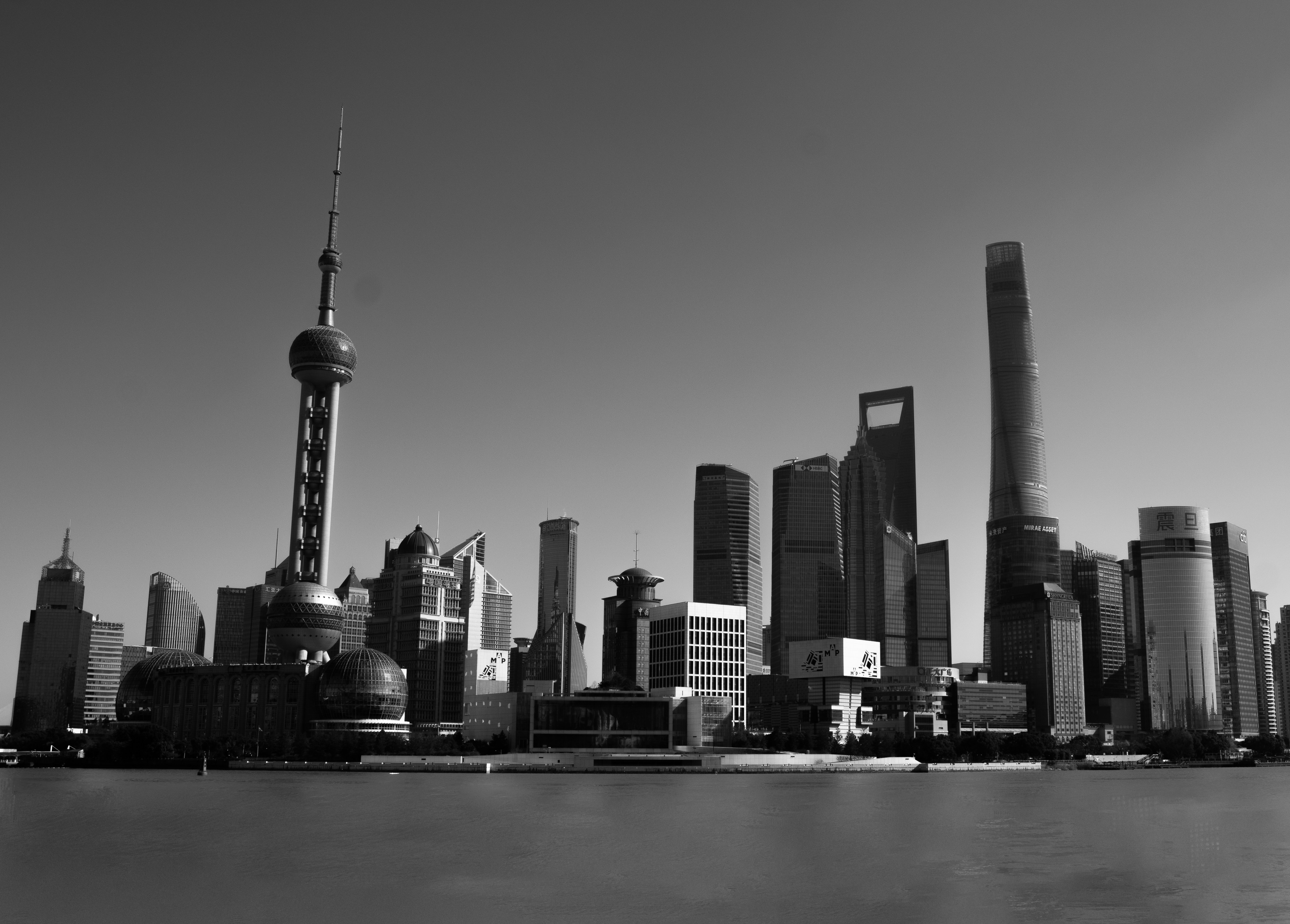 A black and white photo of a city skyline photo – Free City Image on ...