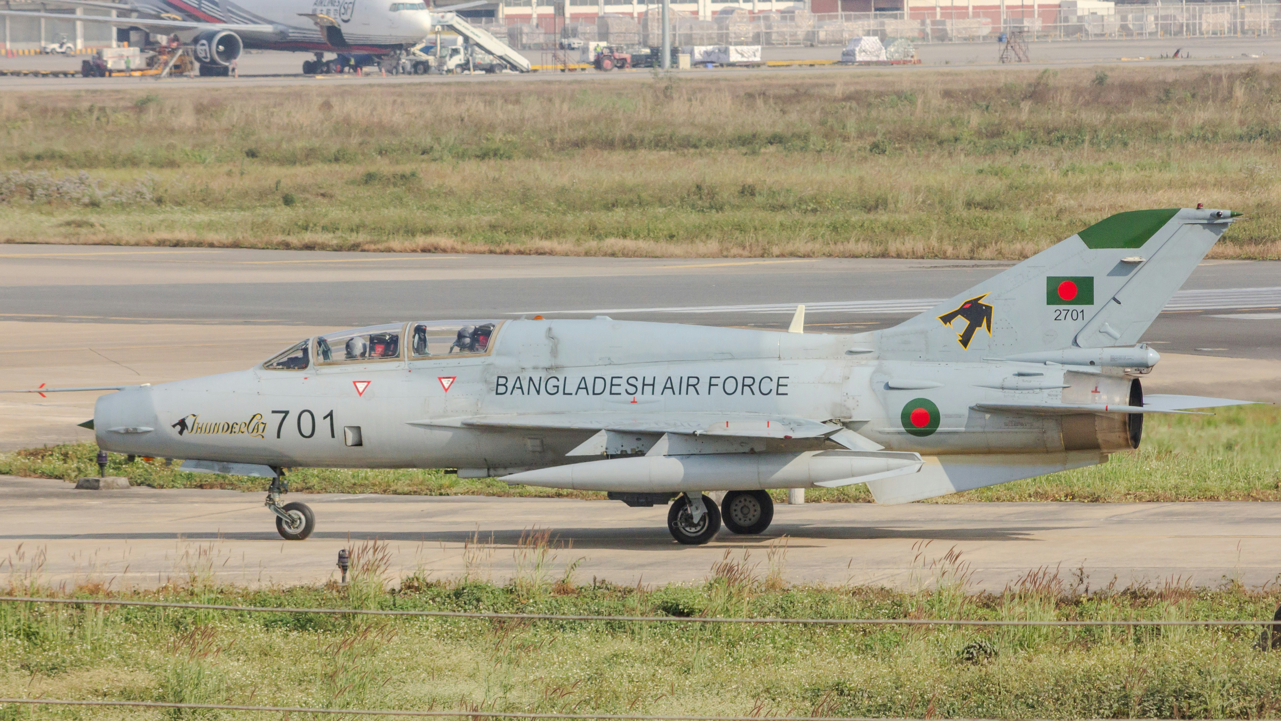 A fighter jet sitting on top of an airport runway photo – Free Hazrat ...