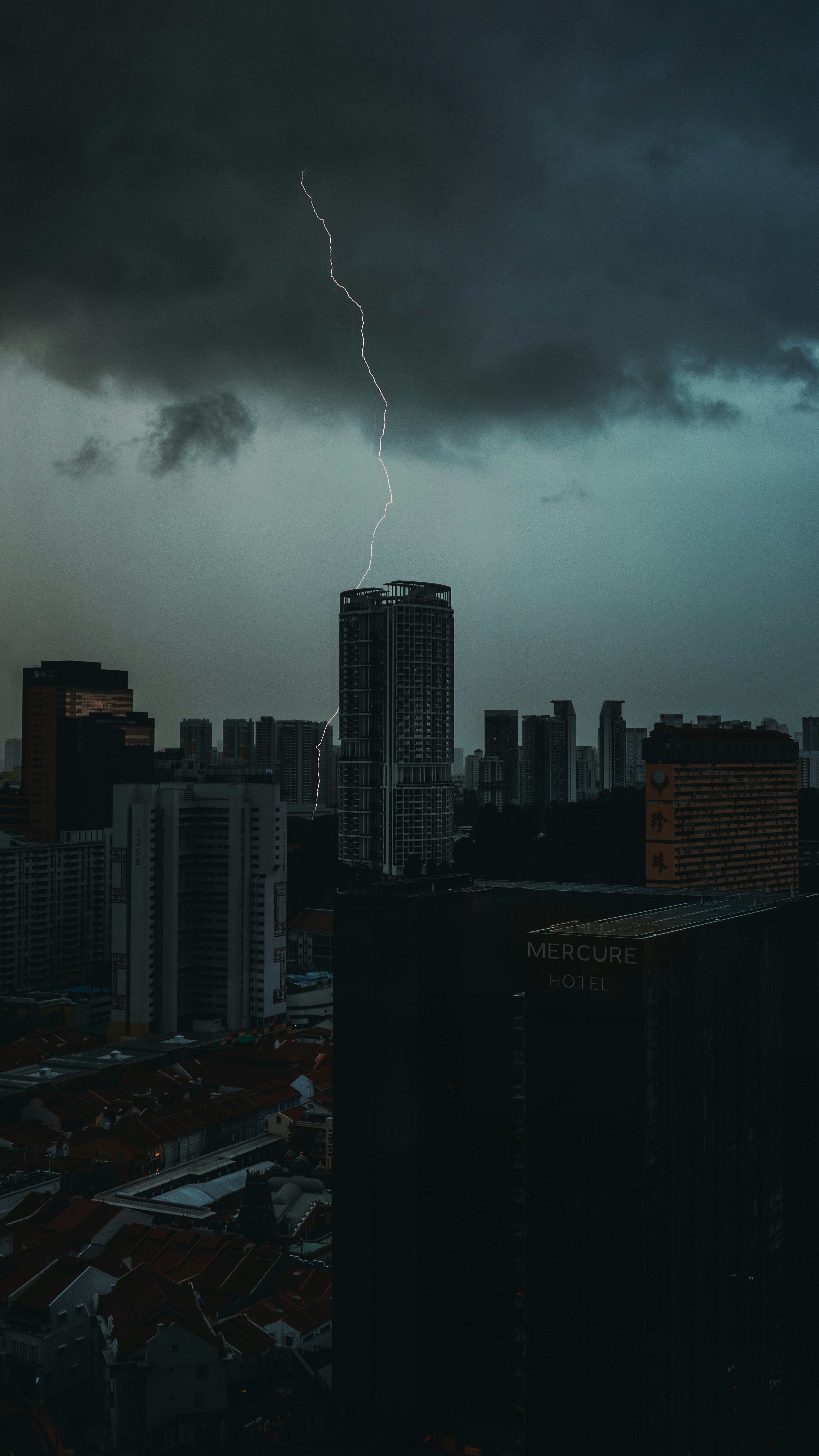 Lance of Light on the Central Tower: Storm-Swept City Skyline