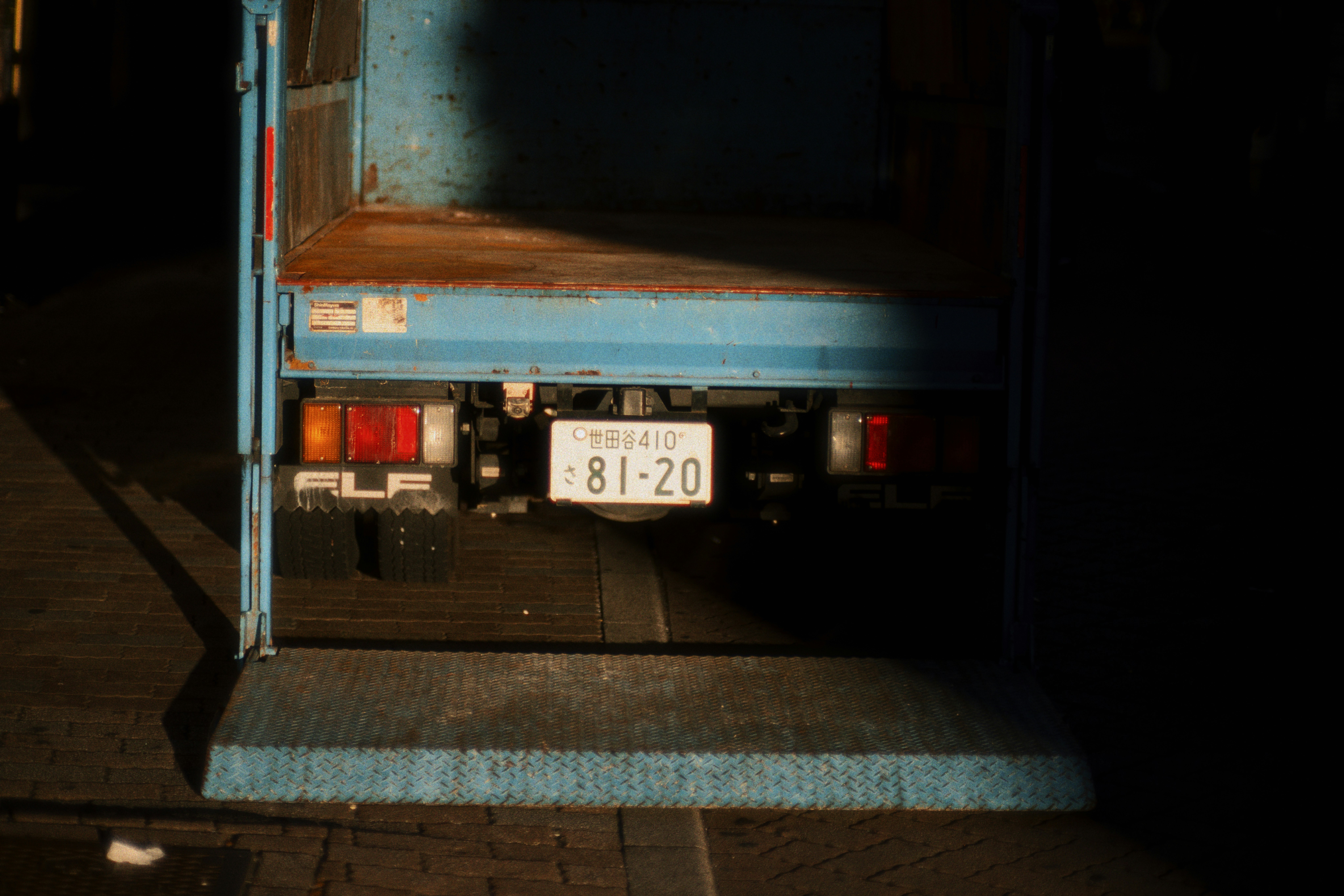 Blue Hauler at Night: The Quiet Dock Reveal