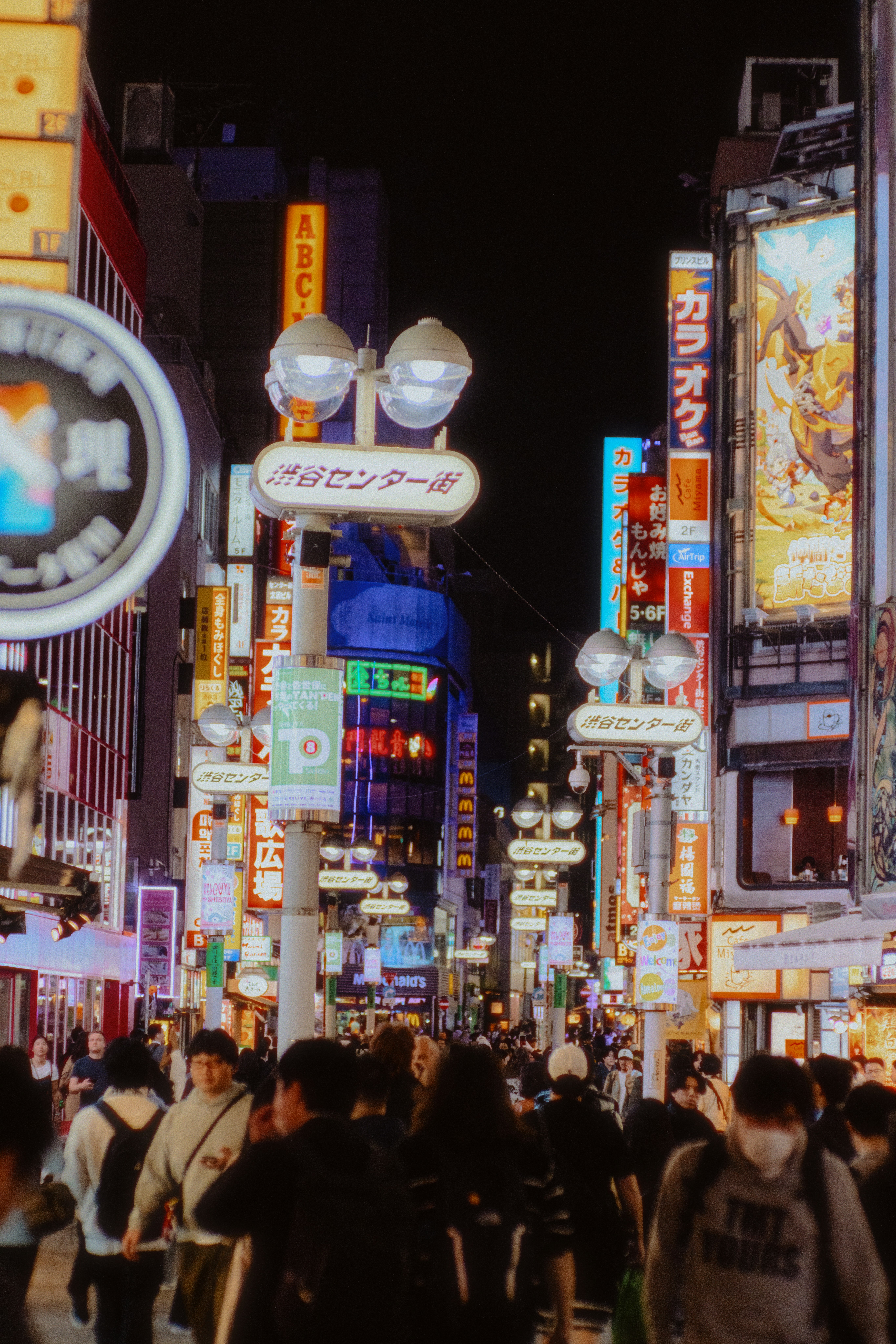 A crowded city street filled with lots of neon signs photo – Free Urban ...
