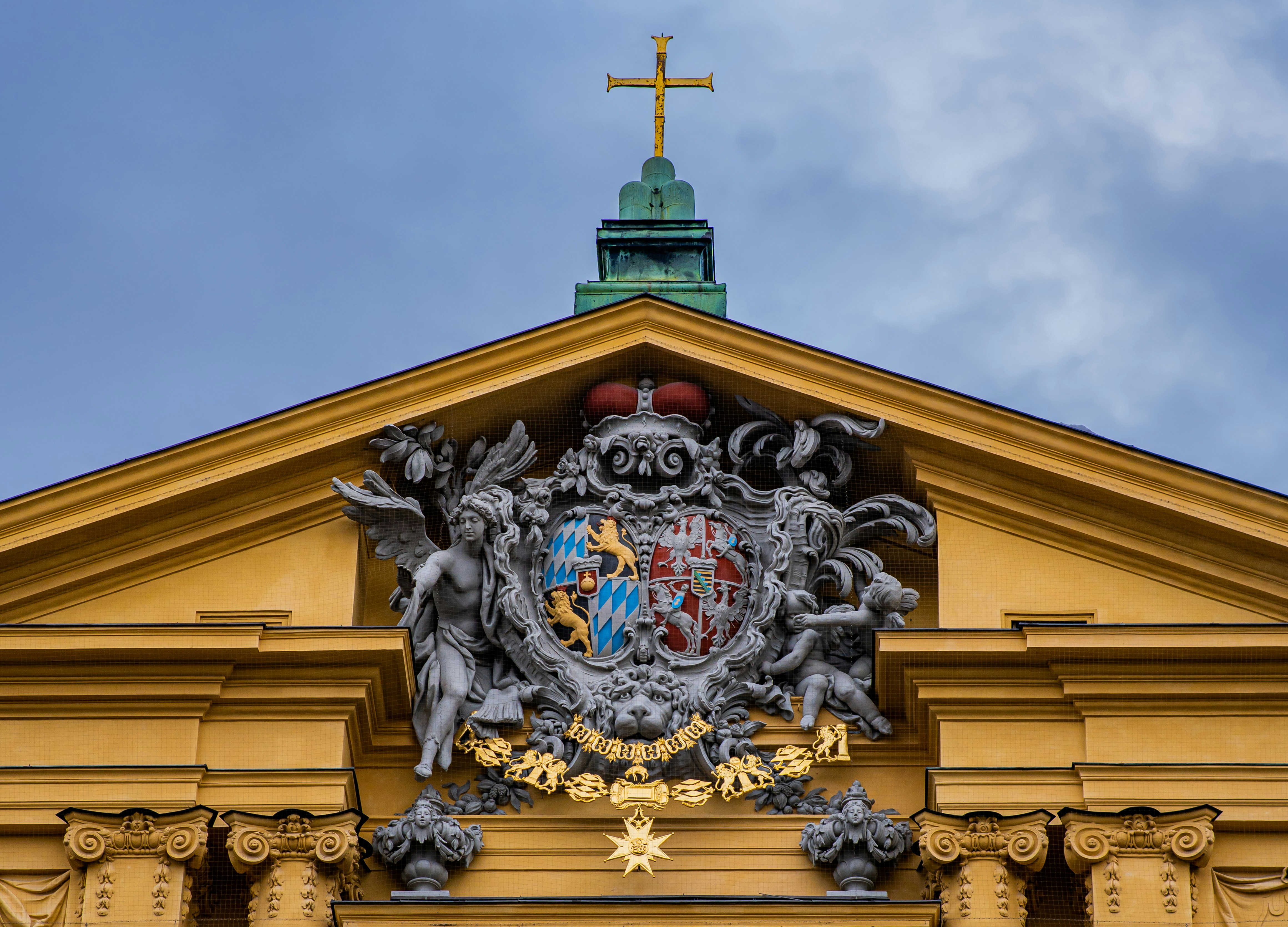 A large building with a cross on top of it photo – Free Travel Image on ...