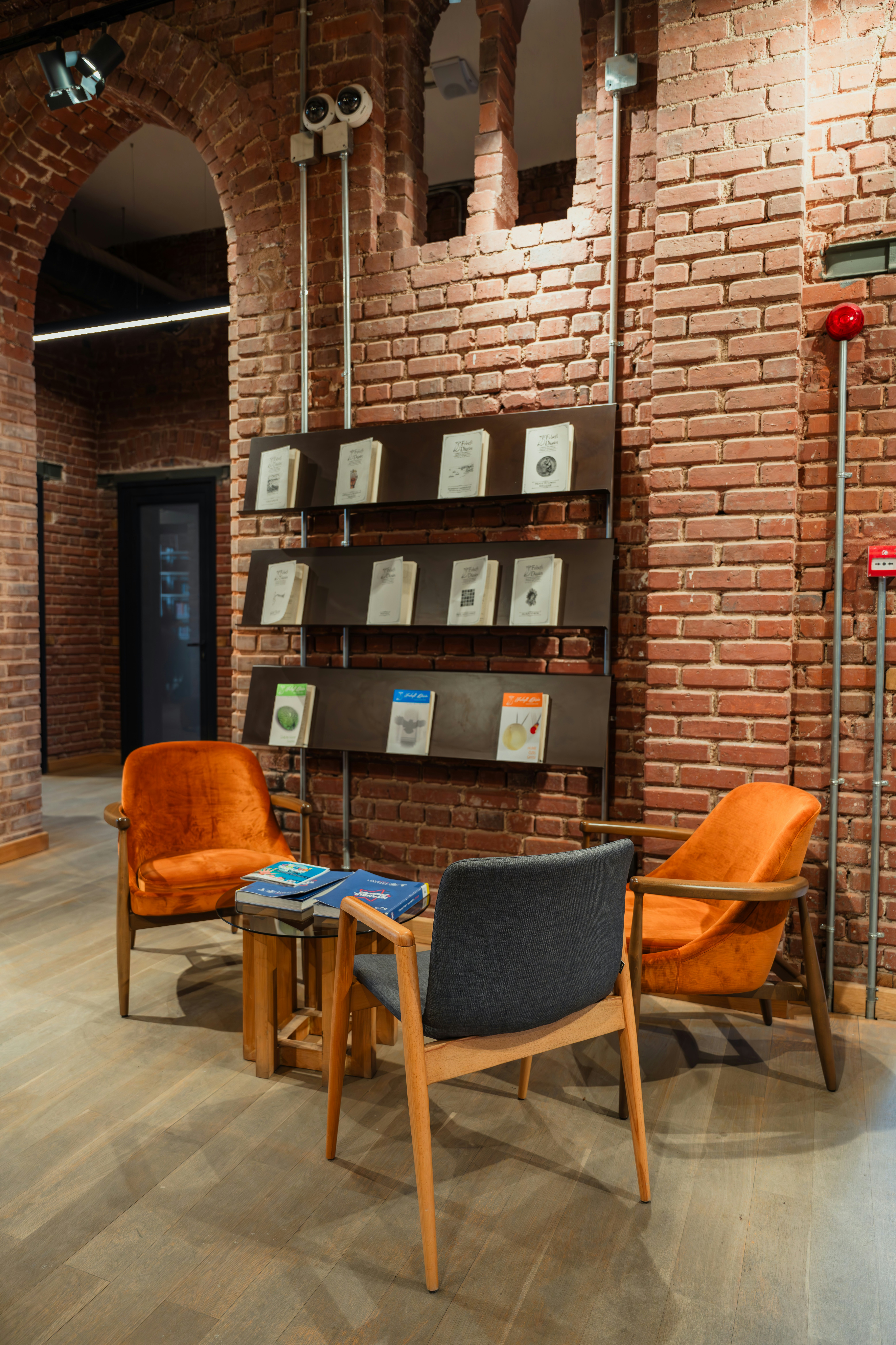 A room with a brick wall and several chairs photo – Free İstanbul Image ...