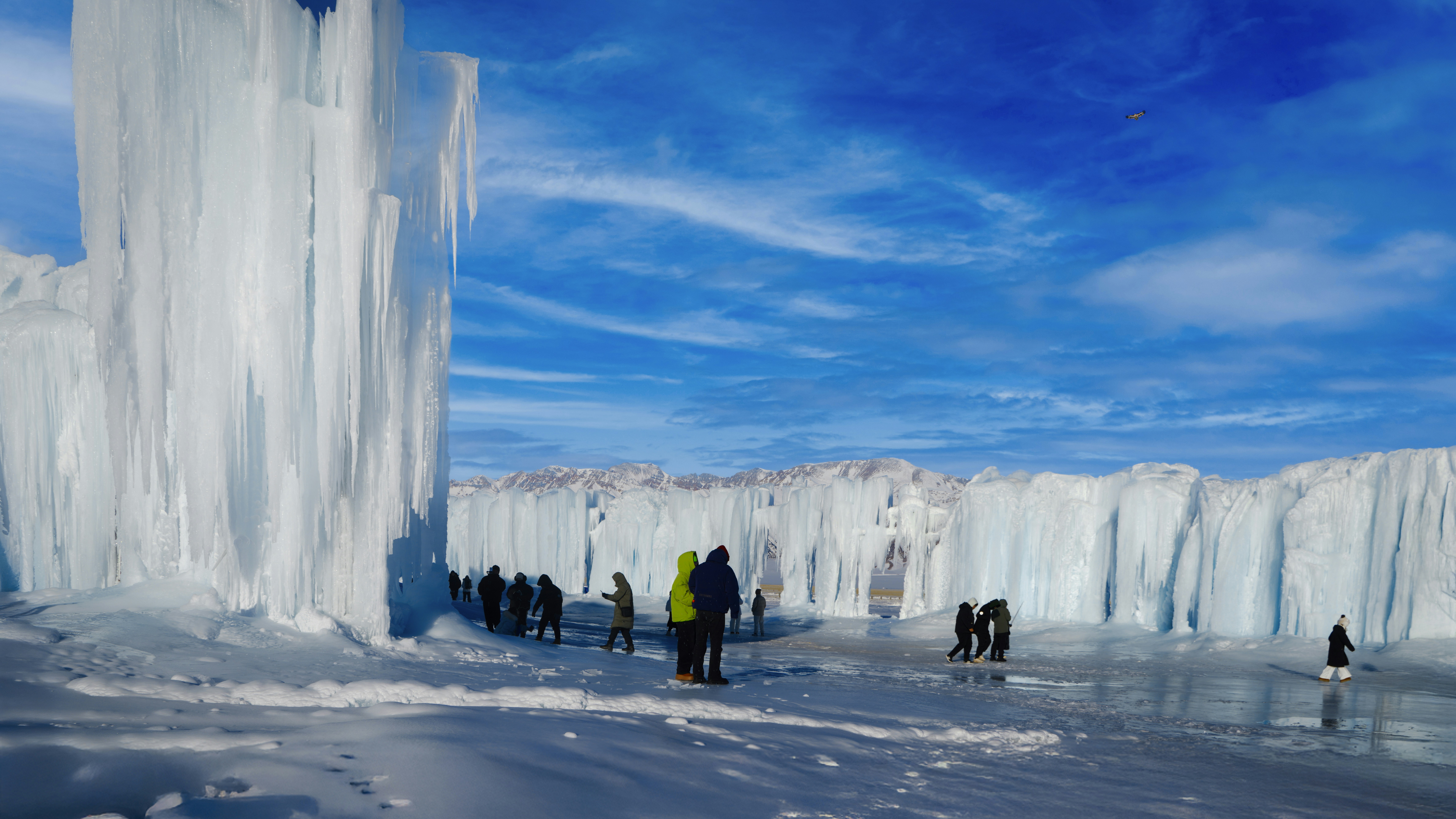 Footfalls Through an Ice Cathedral Under a Pristine Blue Sky