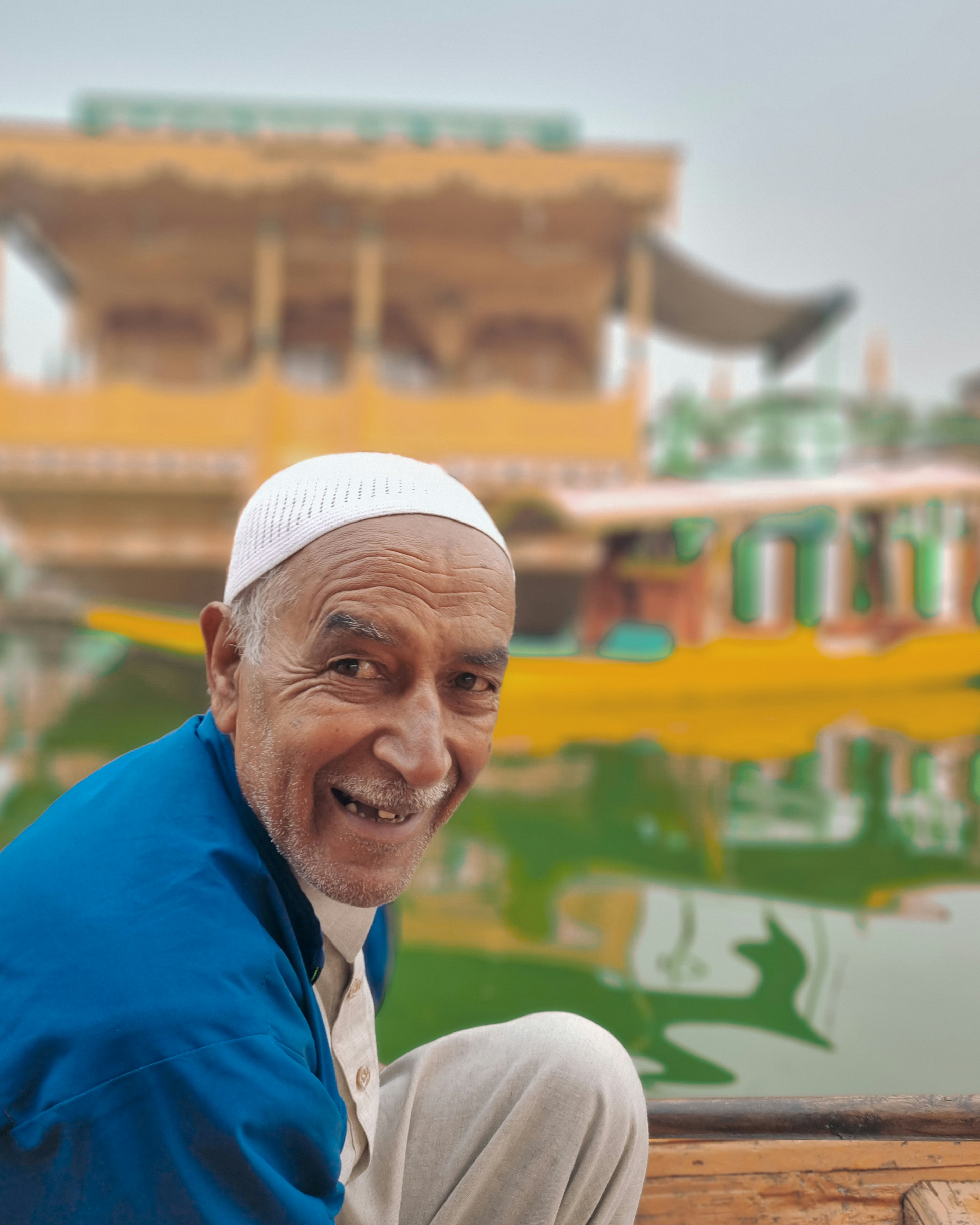 Gilded Ghat Portrait: A Warm Smile by the Golden Riverside Temple