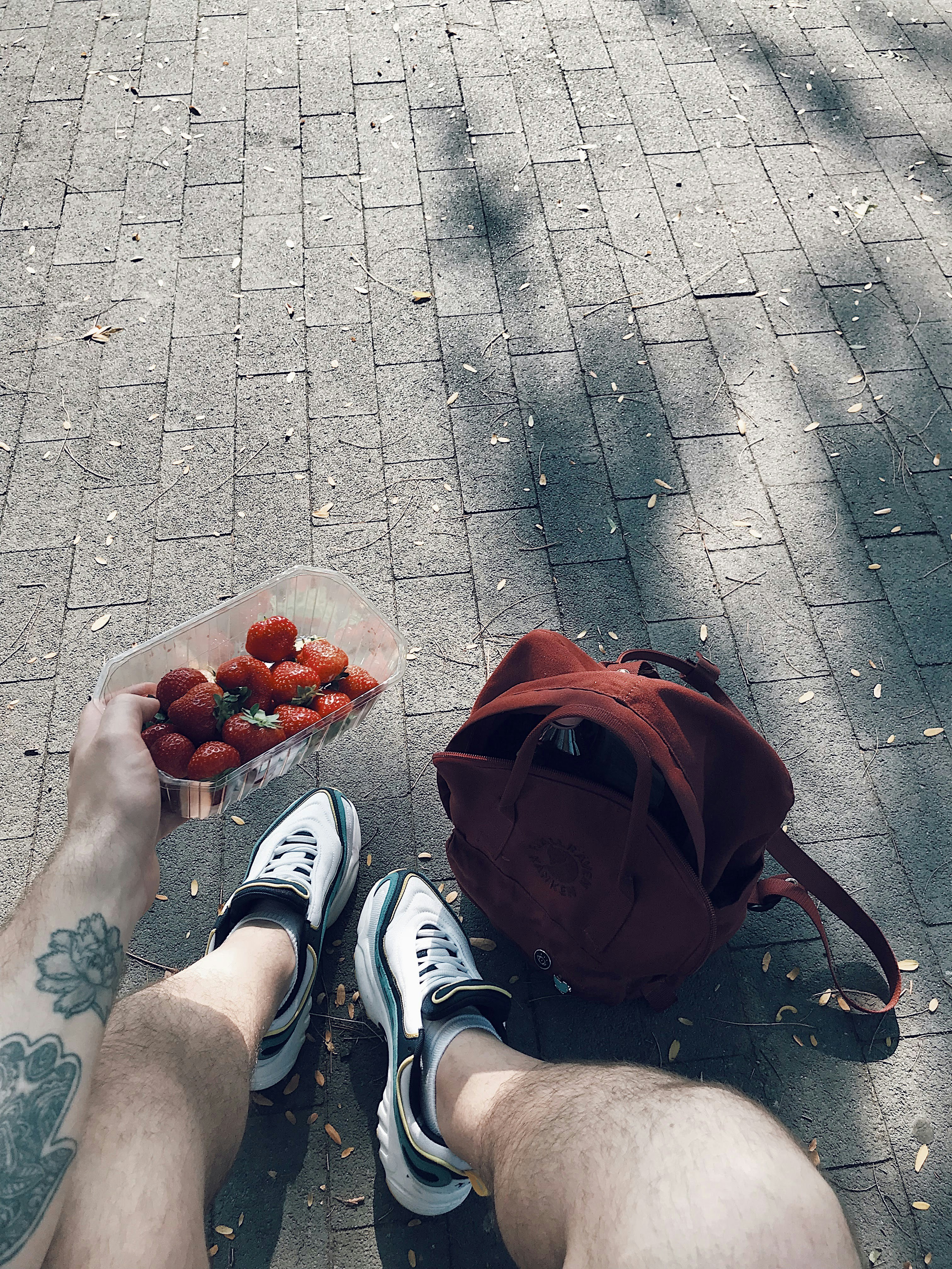 Strawberries on the Go: A Street-Level Snack Moment