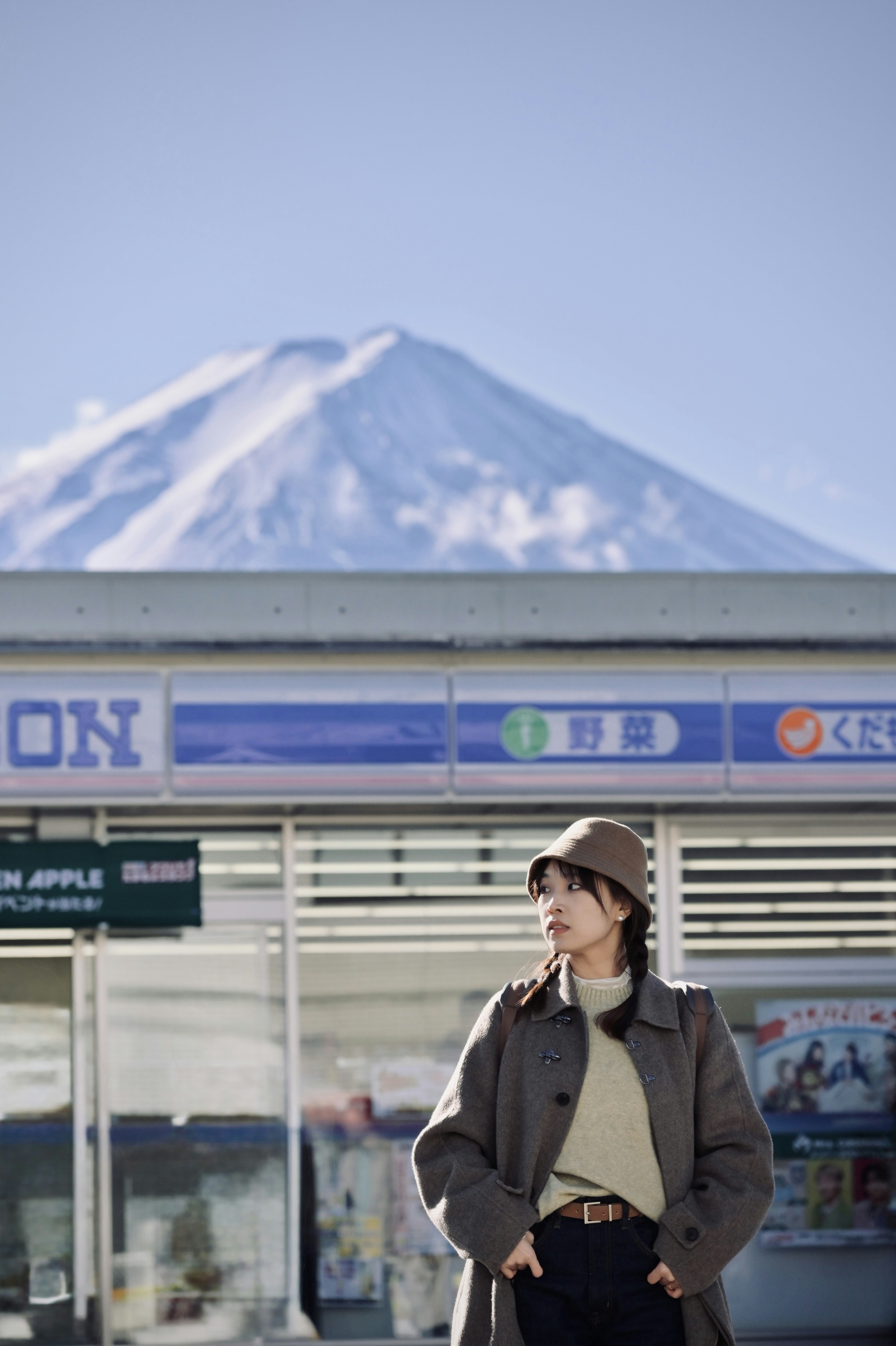 Street Style Portrait Framed by a Snow-Capped Fuji