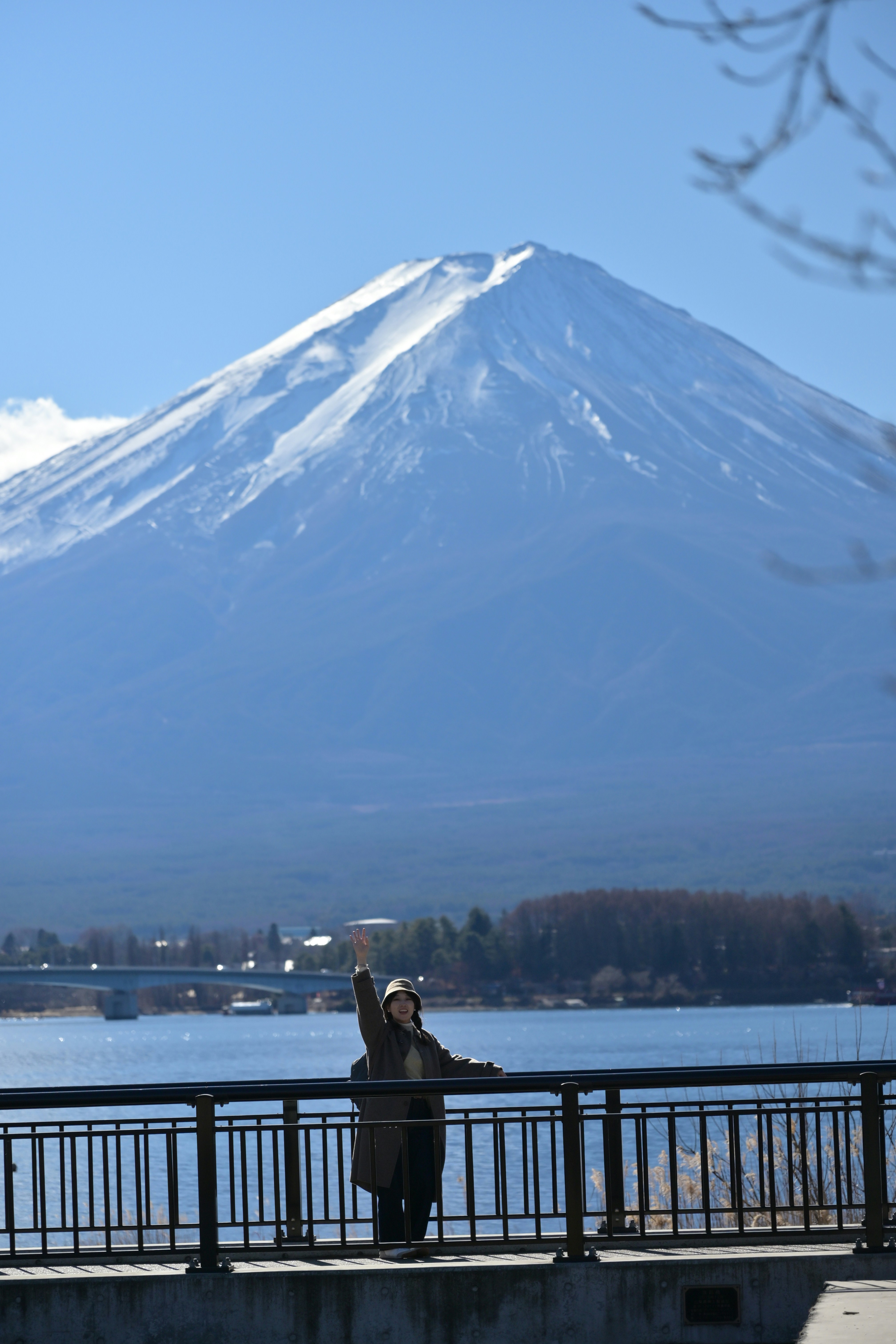 Lone Figure on the Lakeside Rail, Mount Fuji Looms in a Cool Blue Dawn